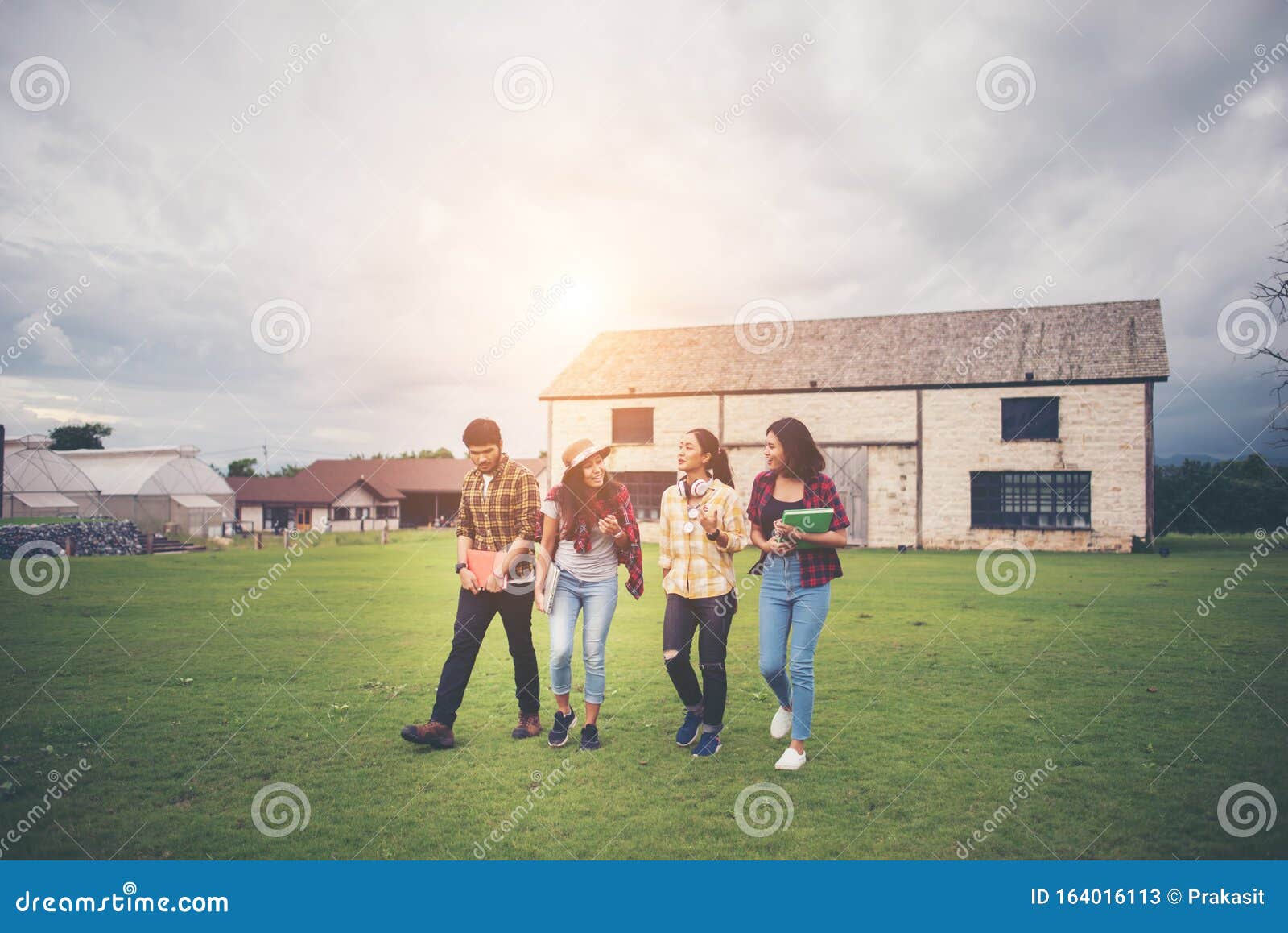 Group of Student Walking through the Park after Class. Stock Image ...