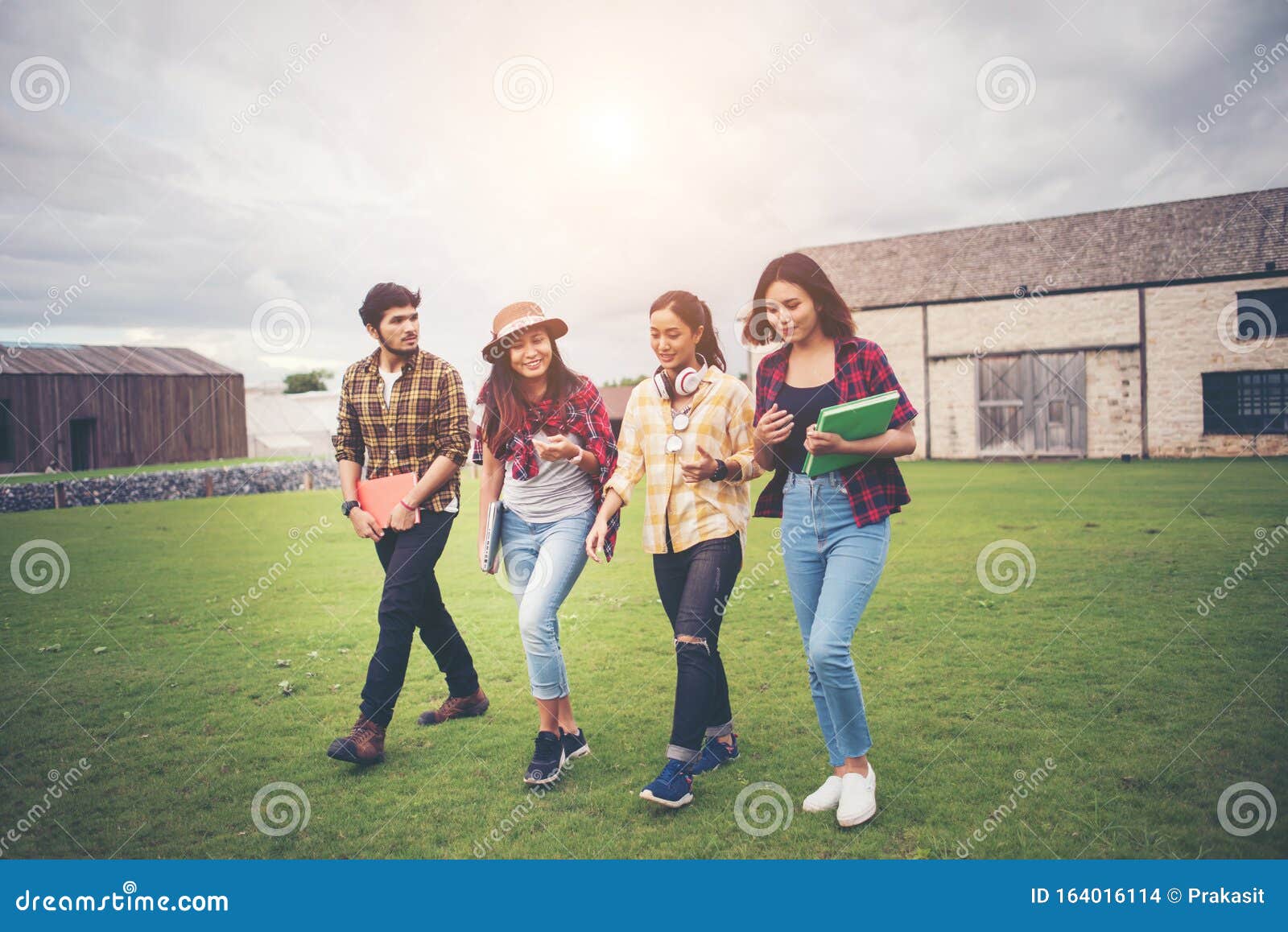 Group of Student Walking through the Park after Class. Stock Photo ...