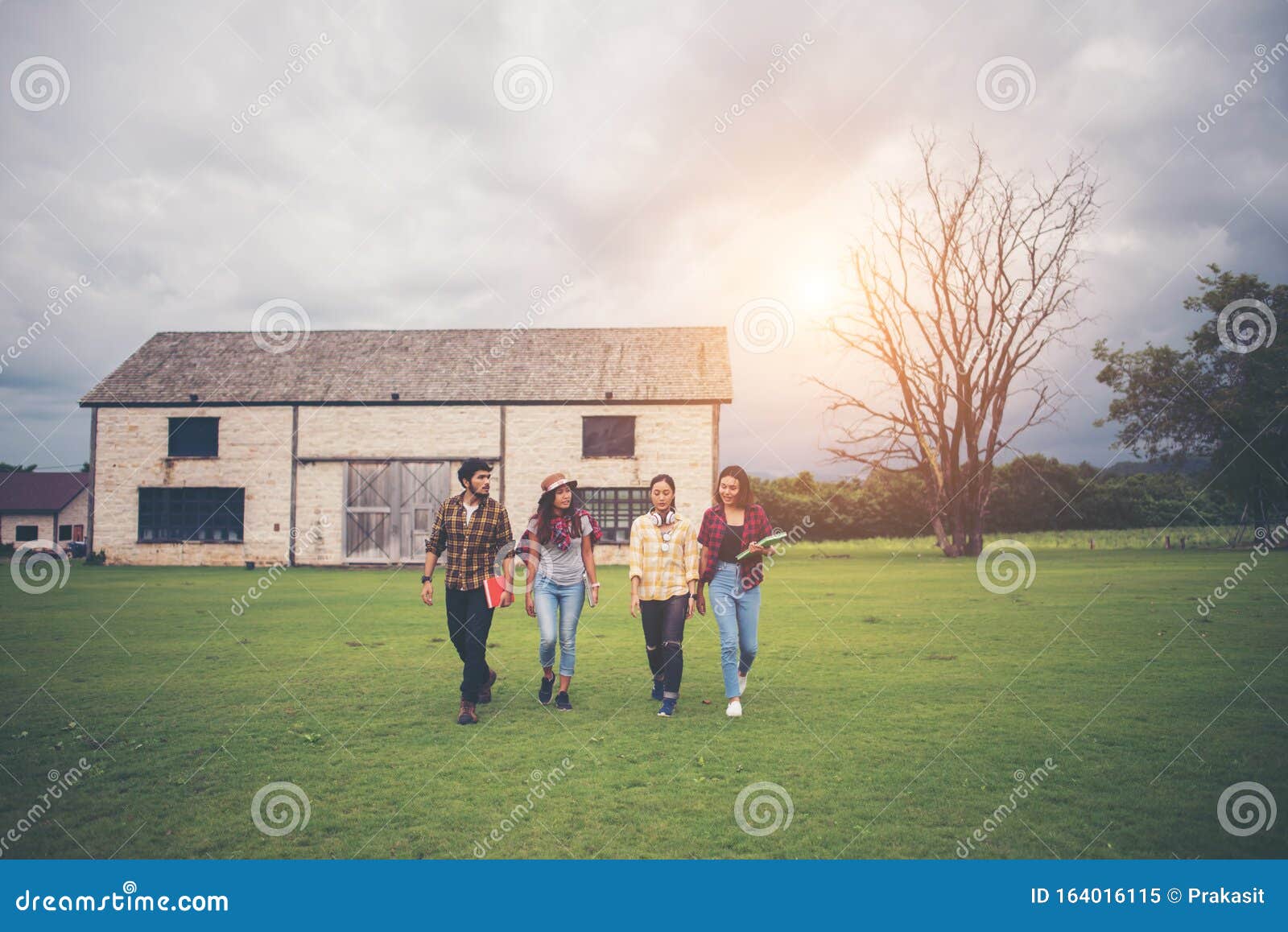 Group of Student Walking through the Park after Class. Stock Image ...