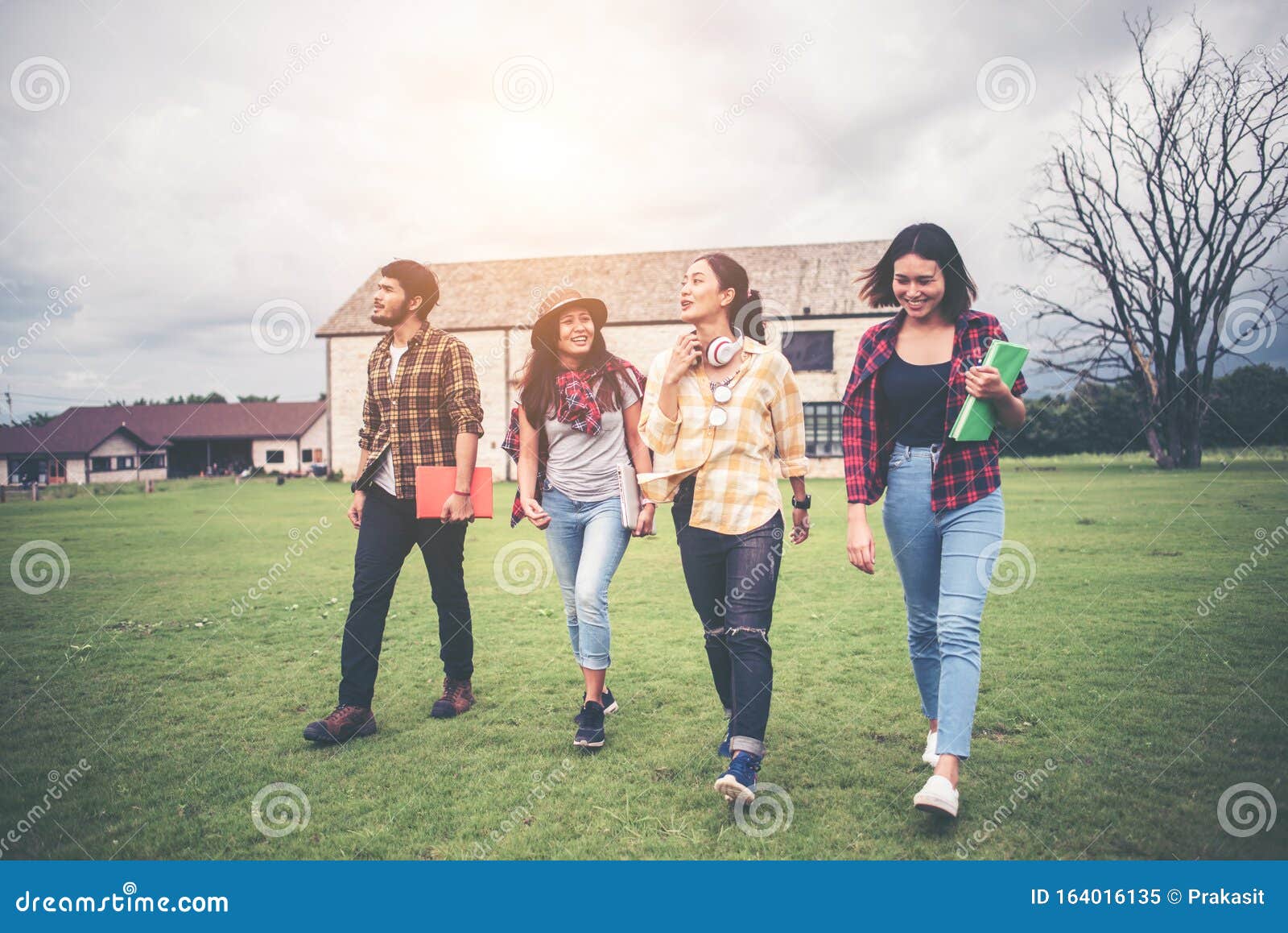 Group of Student Walking through the Park after Class. Stock Image ...