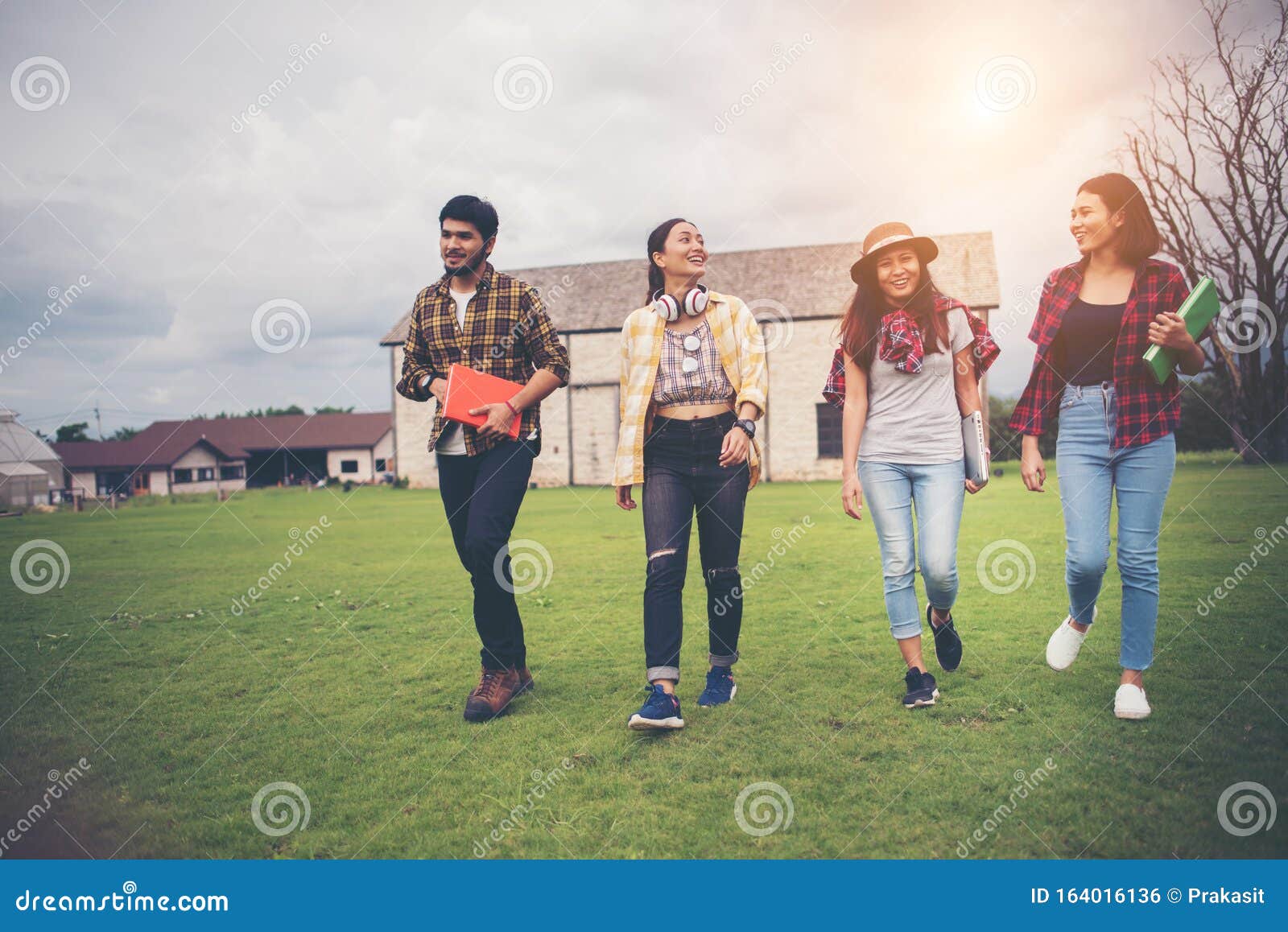Group of Student Walking through the Park after Class. Stock Photo ...