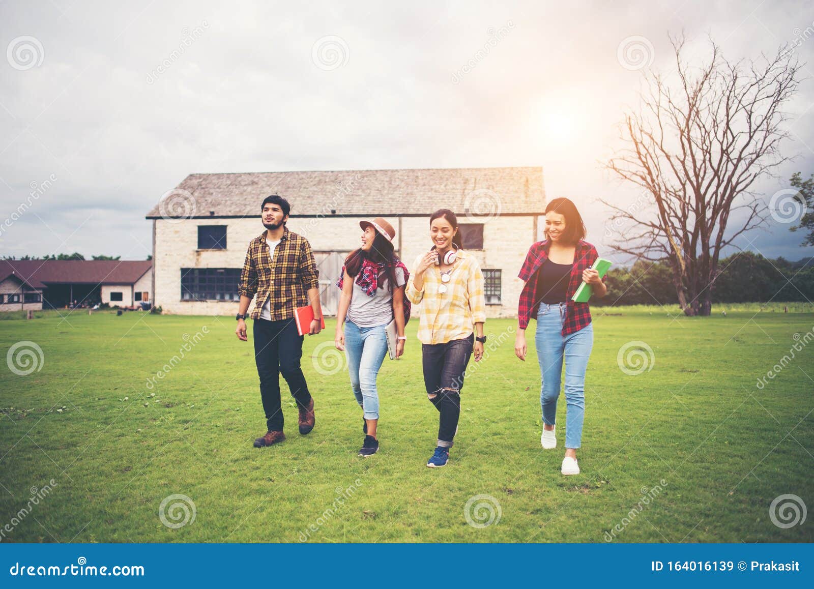 Group of Student Walking through the Park after Class. Stock Image ...