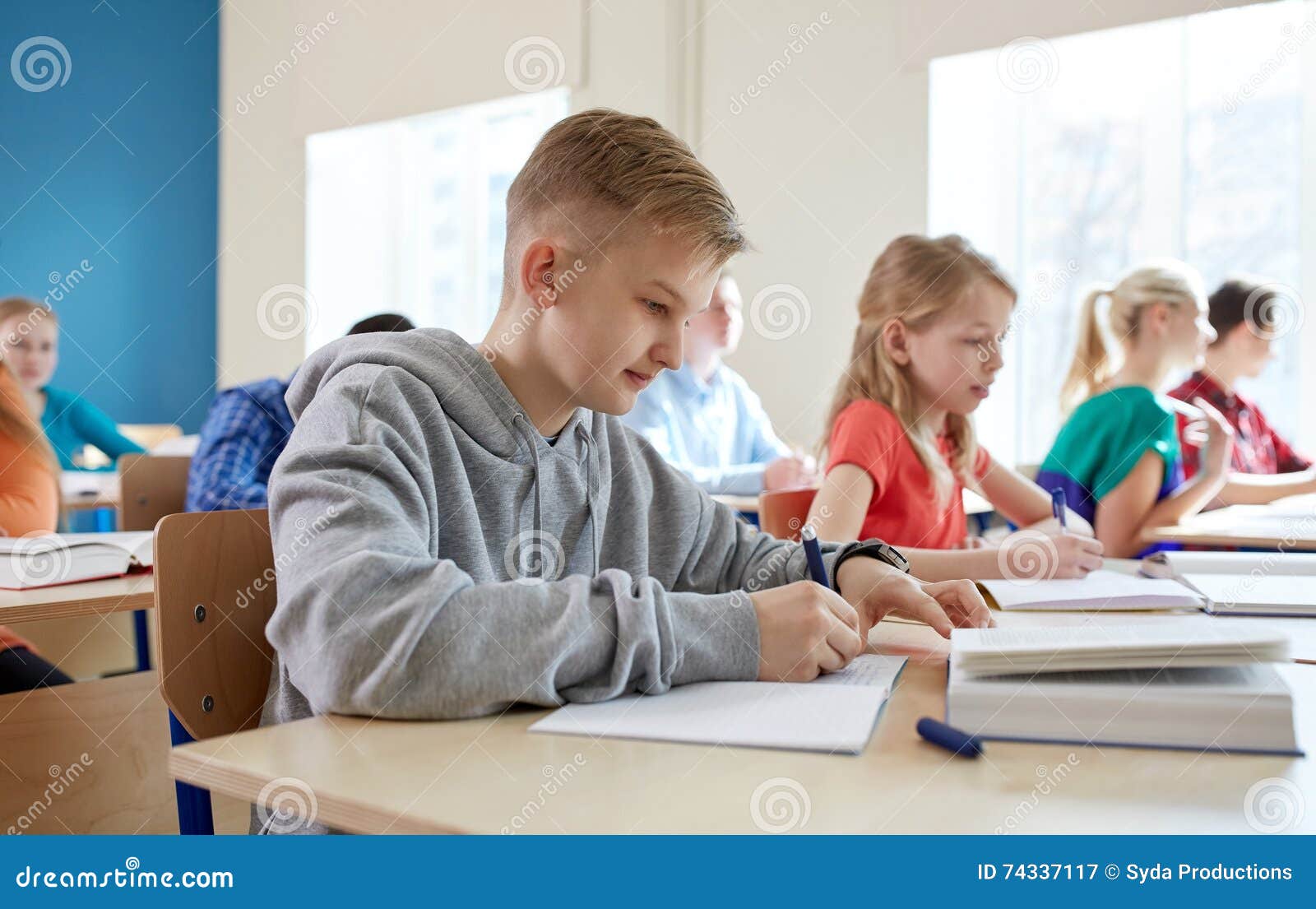 Group of Students with Books Writing School Test Stock Image - Image of ...
