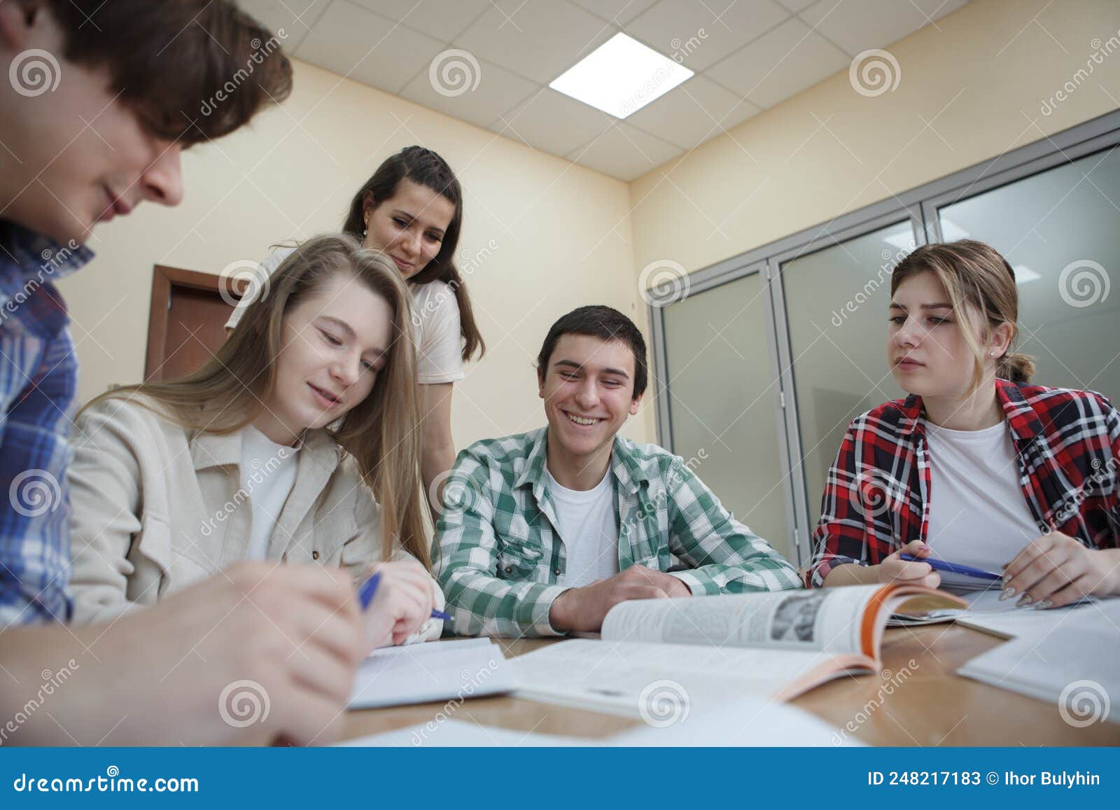 Group of Students at Classroom Together Stock Image - Image of reading ...