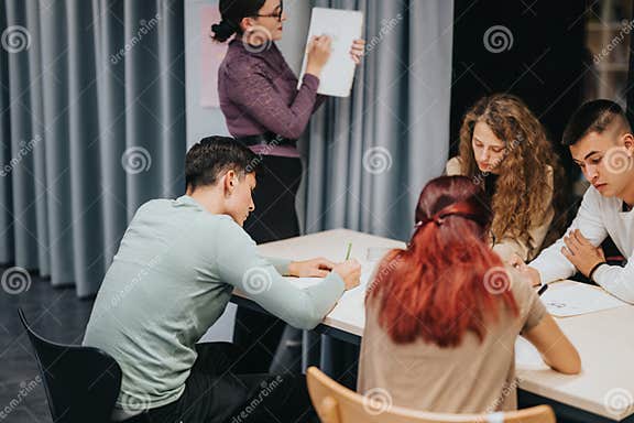 Group of Students Collaborating on a Classroom Project Stock Image ...