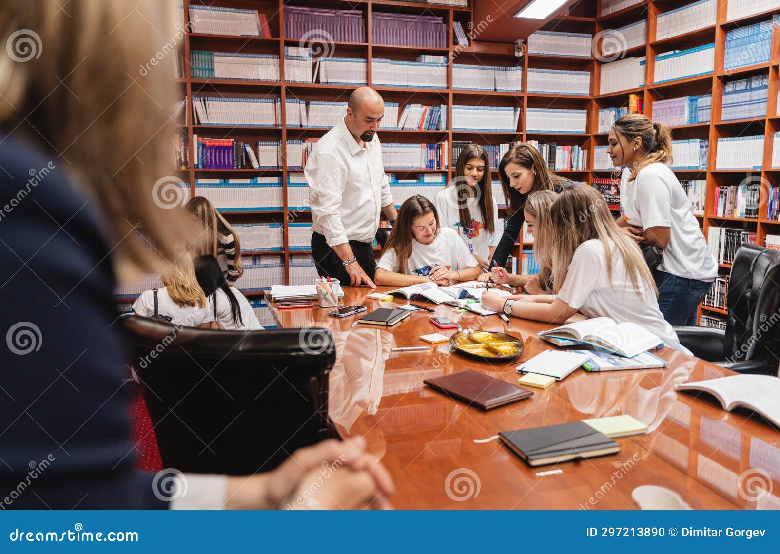 A Diverse Group of Students and Professors Engaged in Various Academic ...