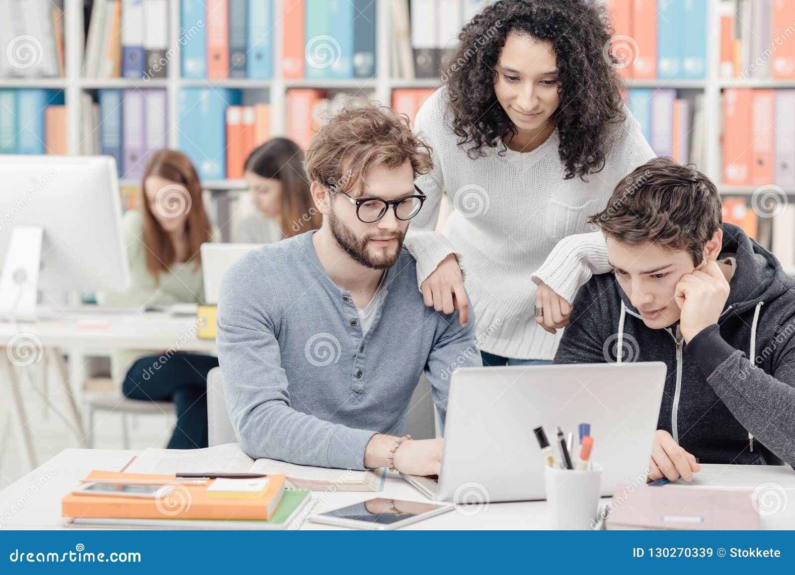 Group of Students Connecting with a Laptop Stock Image - Image of class ...
