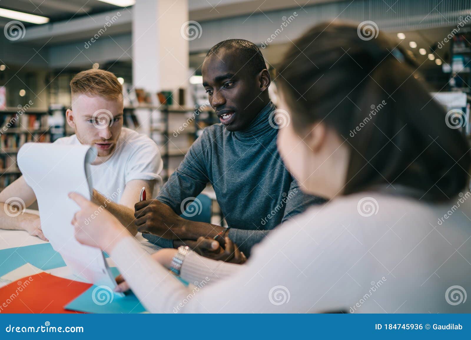 Group of Students Cooperating and Preparing for Exam Together Stock ...