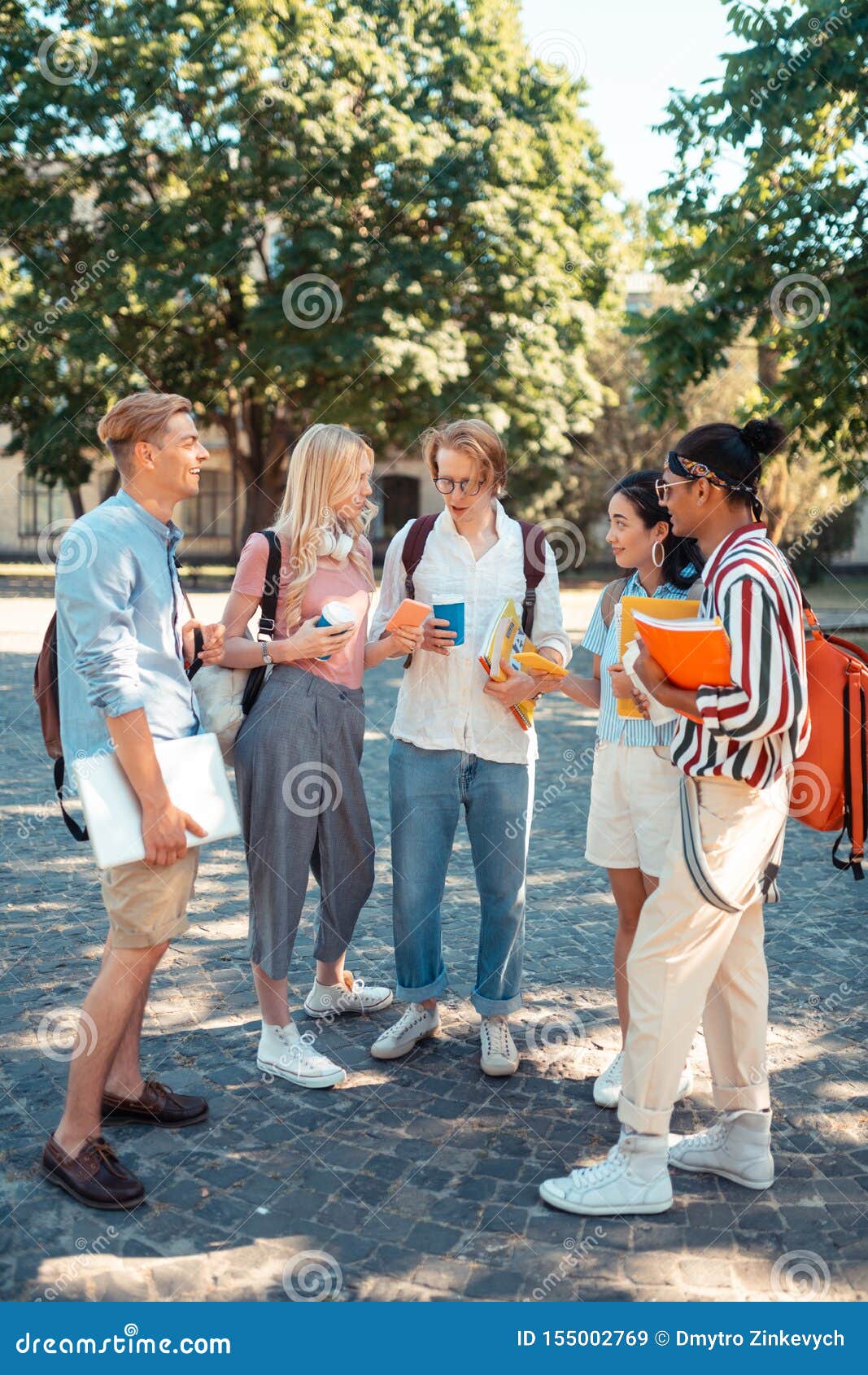 Group of Students Deciding Where To Go Next. Stock Image - Image of ...