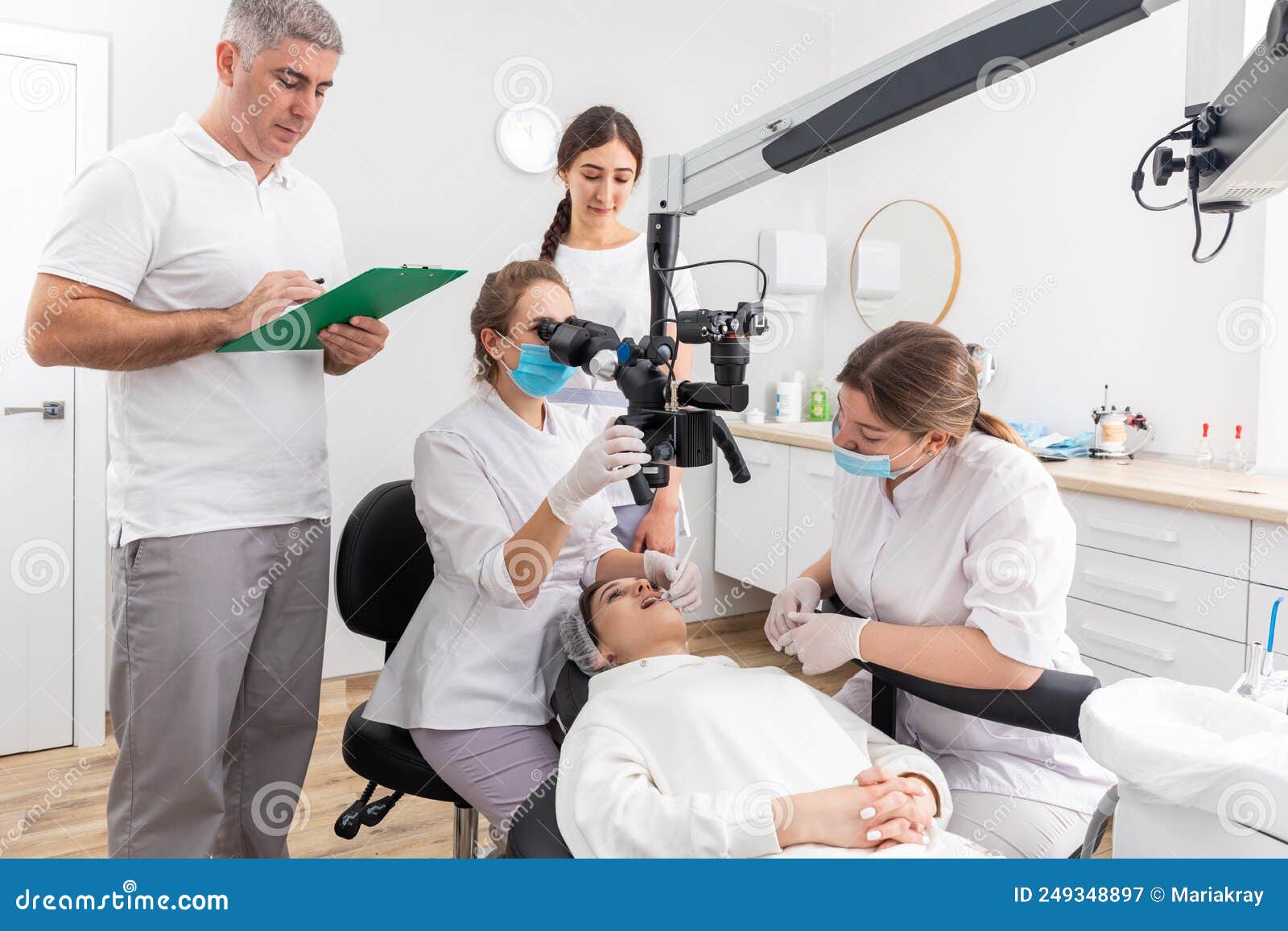 Group of Students in Dental Clinic Learn Watching Dental Treatment with ...