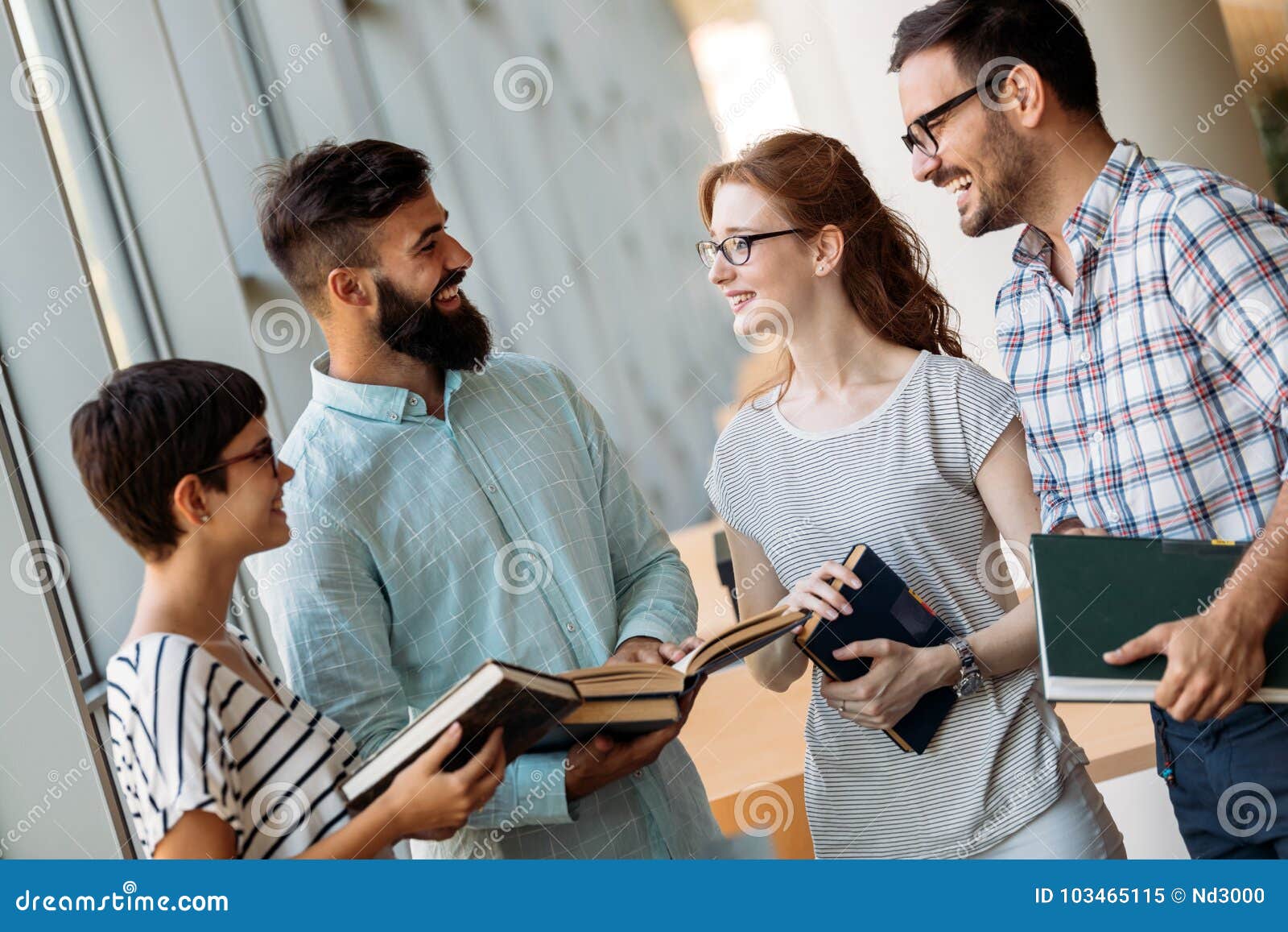 Group of Students Discussing in University Library Stock Image - Image ...