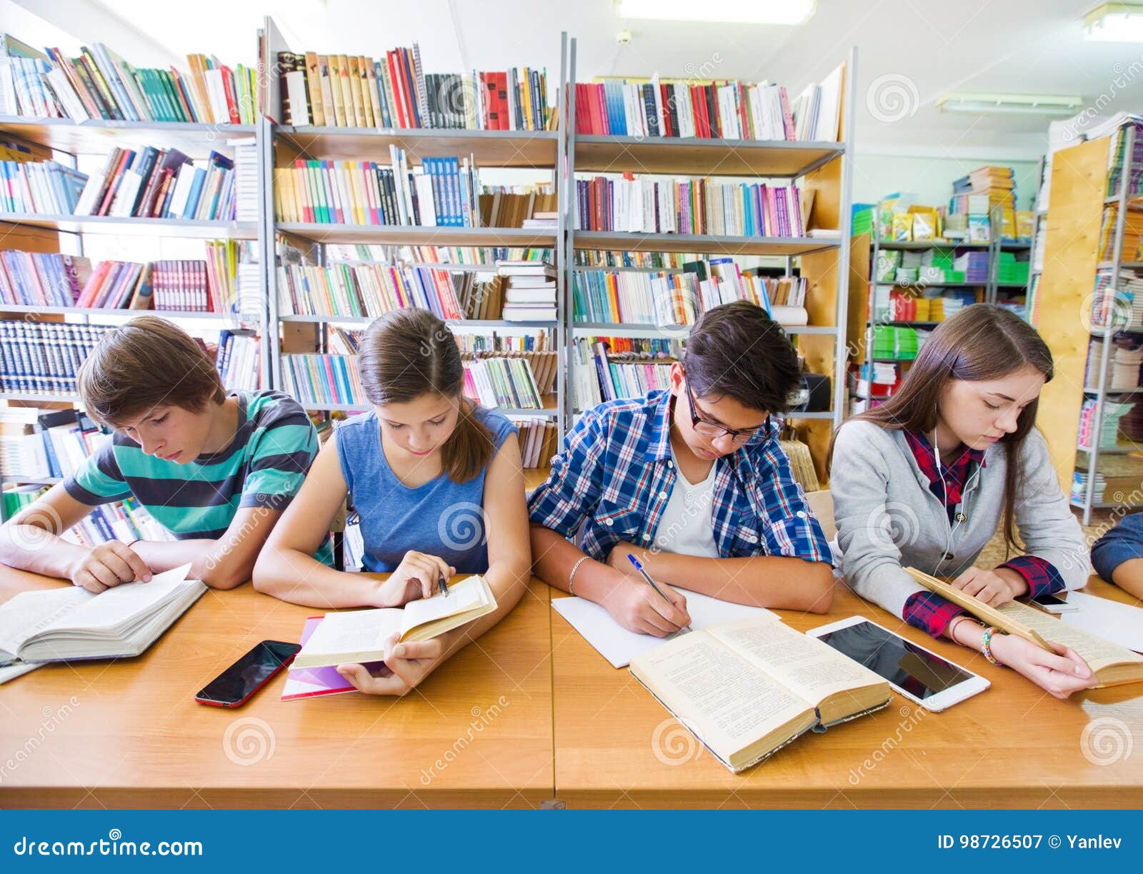 Teens in library stock image. Image of desk, ethnic, hall - 98726507