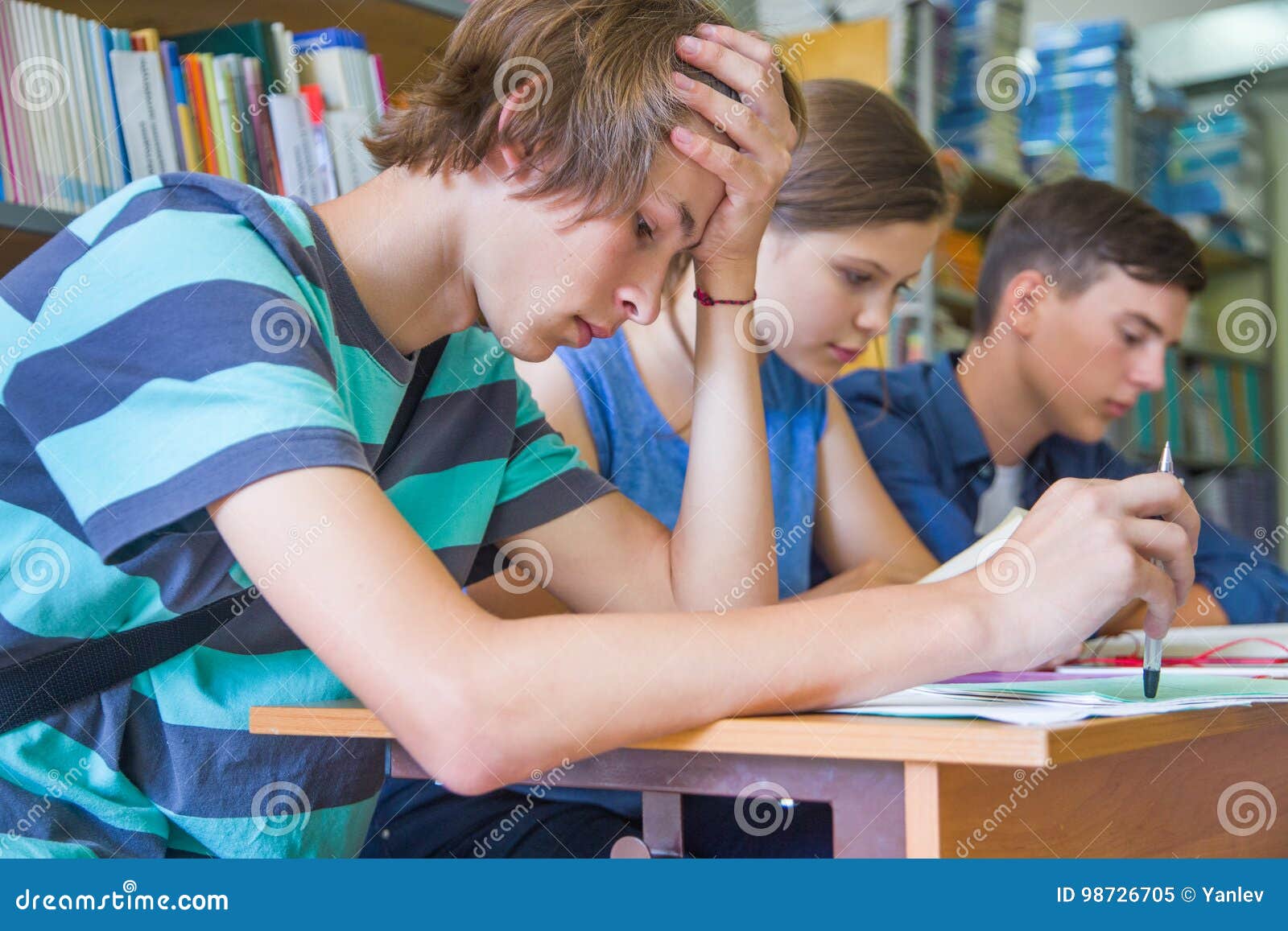 Teens in library stock image. Image of females, library - 98726705