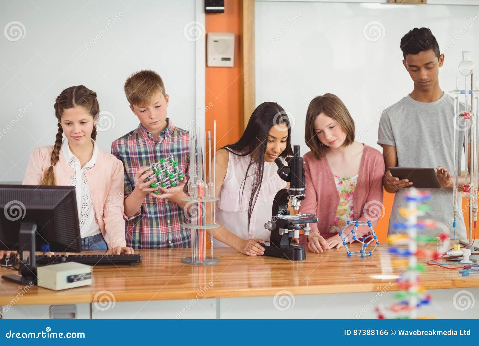 Group of Students Experimenting Molecule Model in Laboratory Stock ...