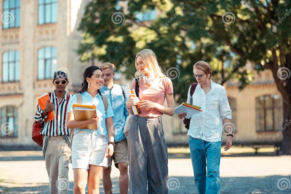 Group of Students Going Home after Classes. Stock Image - Image of ...