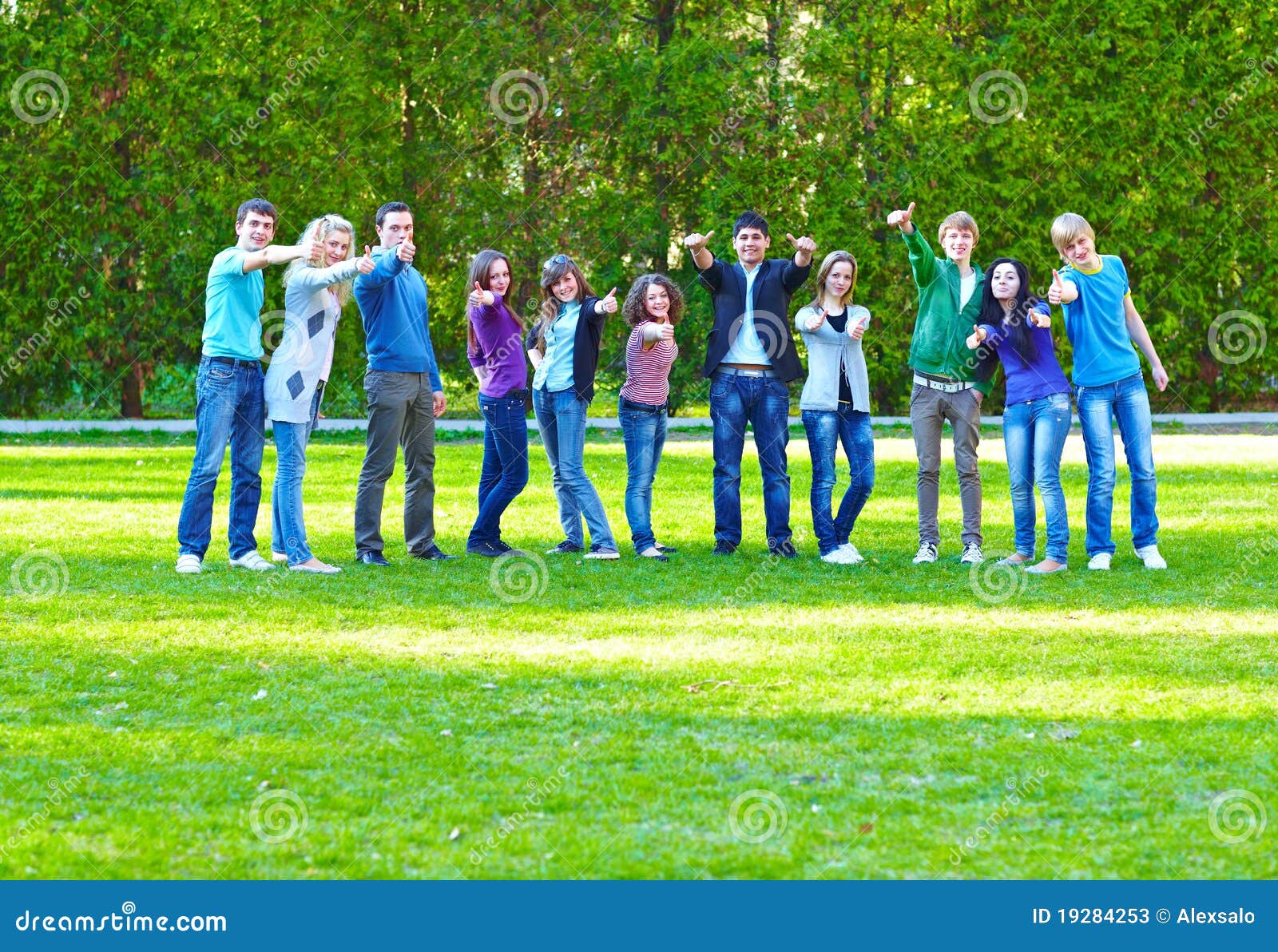 Group of Students on the Grass Stock Image - Image of girls, group ...