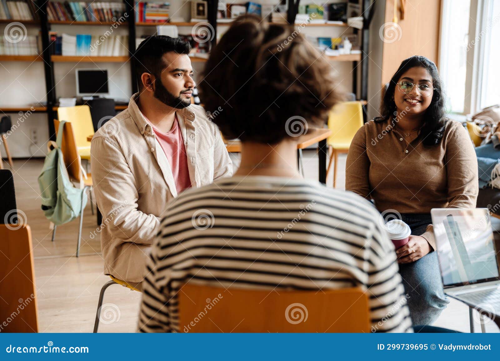 Group of Students Having Discussion while Working on University Project ...