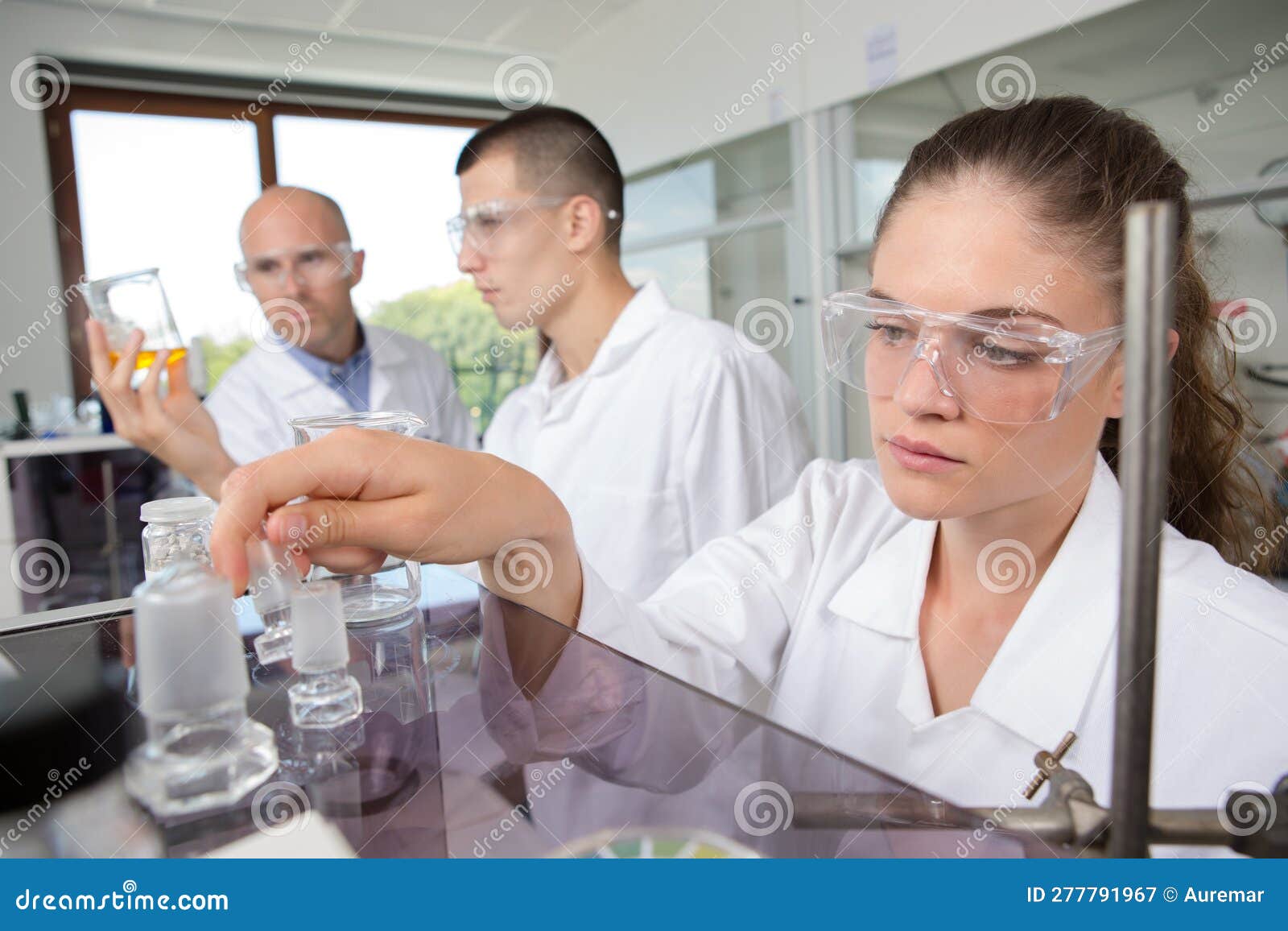 Group students in lab stock image. Image of experiment - 277791967
