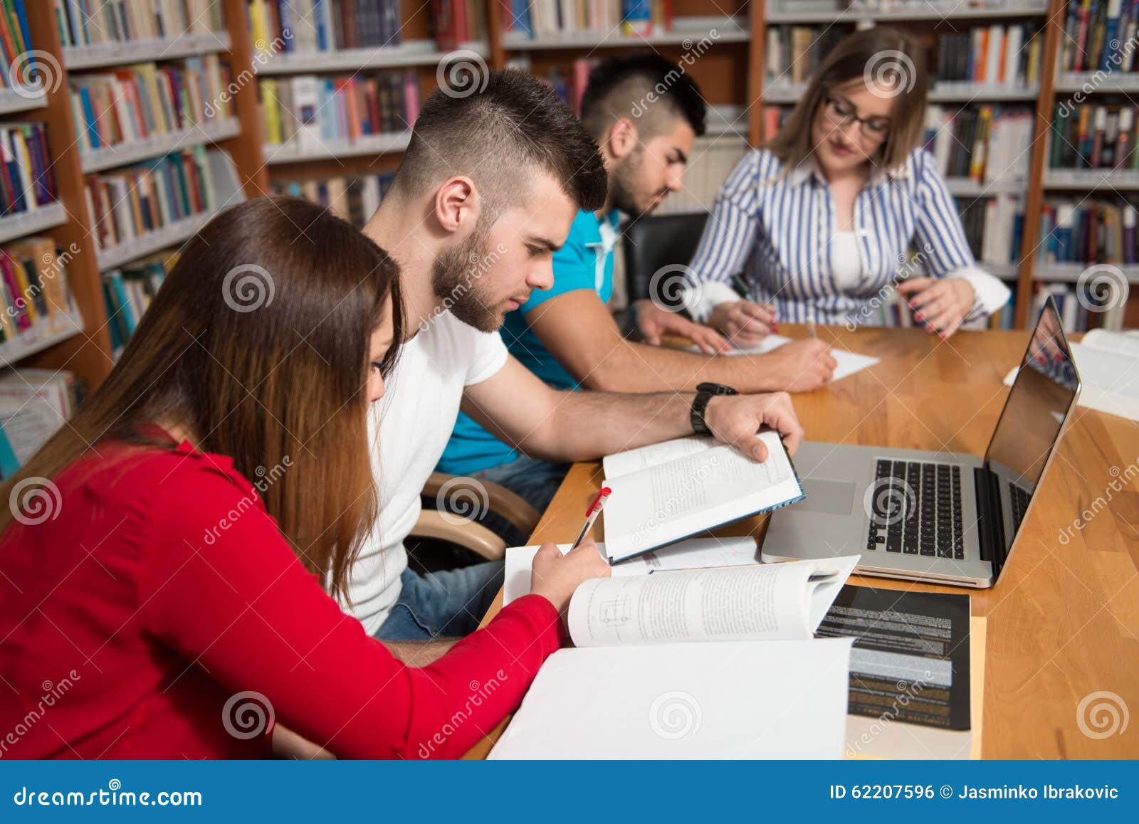 Group of Students with Laptop in Library Stock Photo - Image of ...