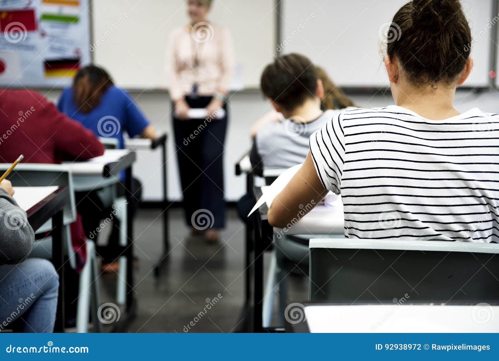 Group of Students Learning in Classroom Stock Photo - Image of teacher ...