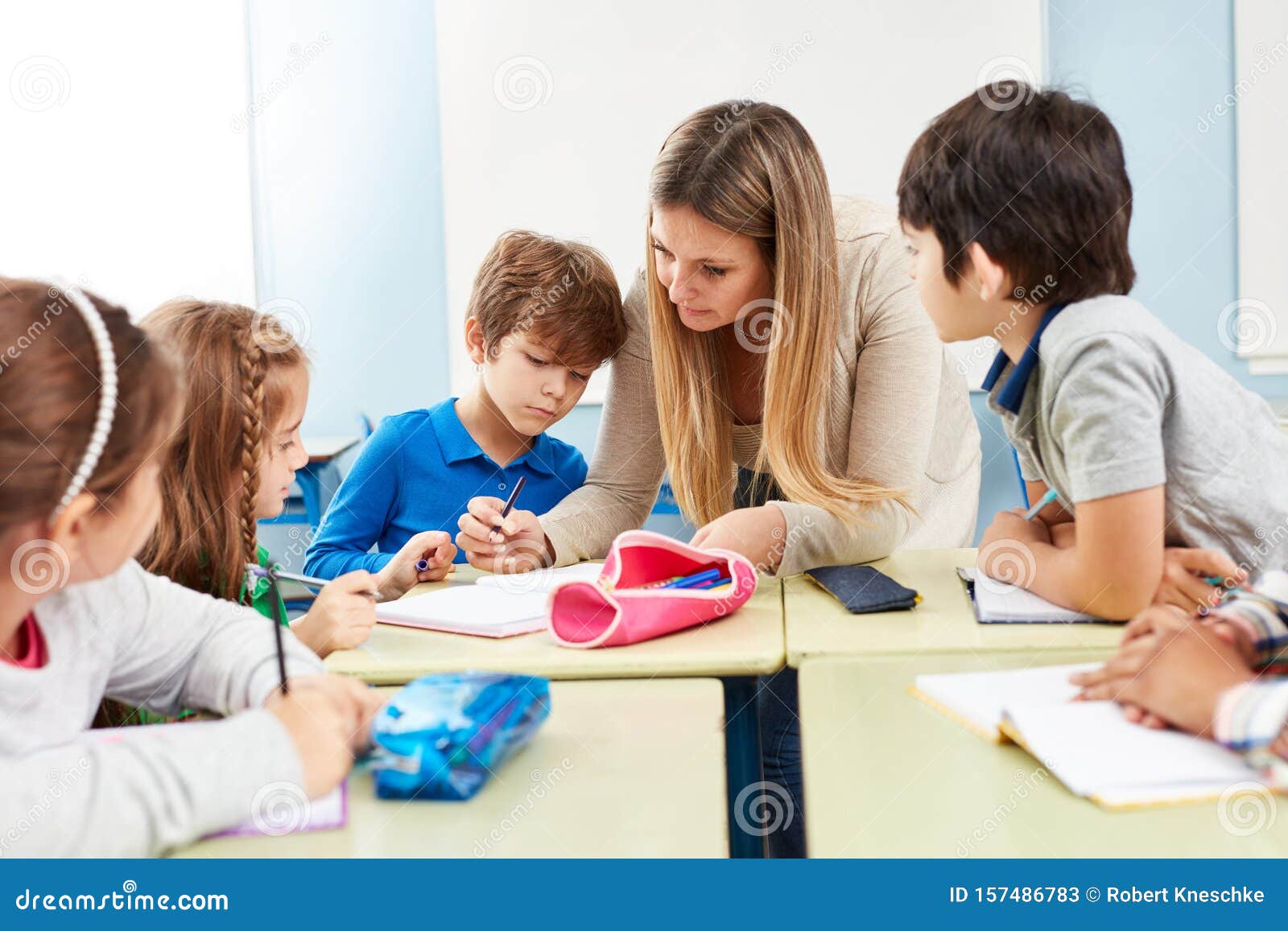 Group of Students Learns with the Help of a Teacher Stock Image - Image ...