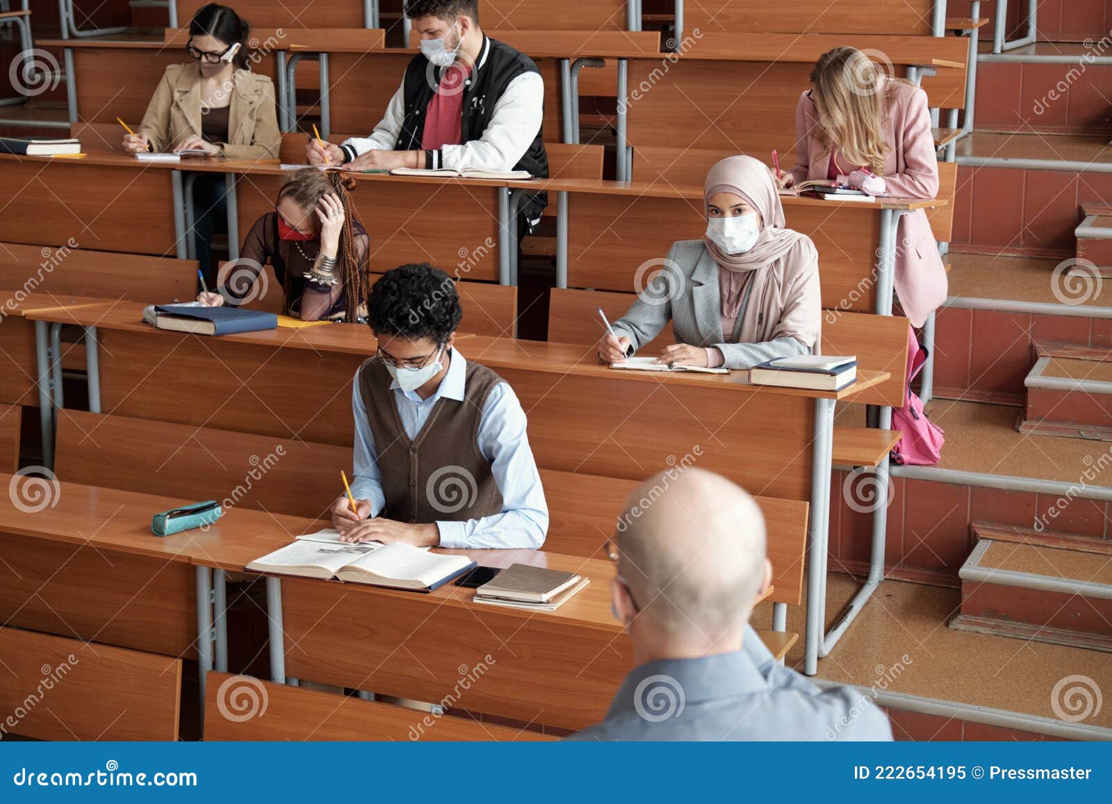 Group of Students Making Notes by Desks Stock Image - Image of teacher ...