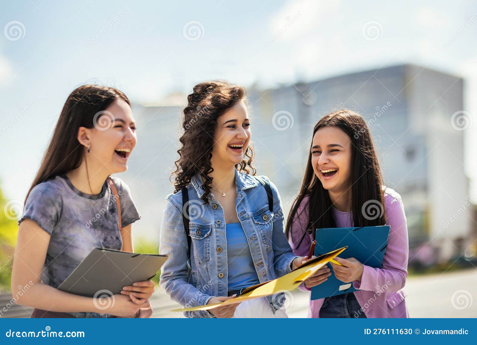 Students with Notebook Studying Together Outdoors Stock Photo - Image ...