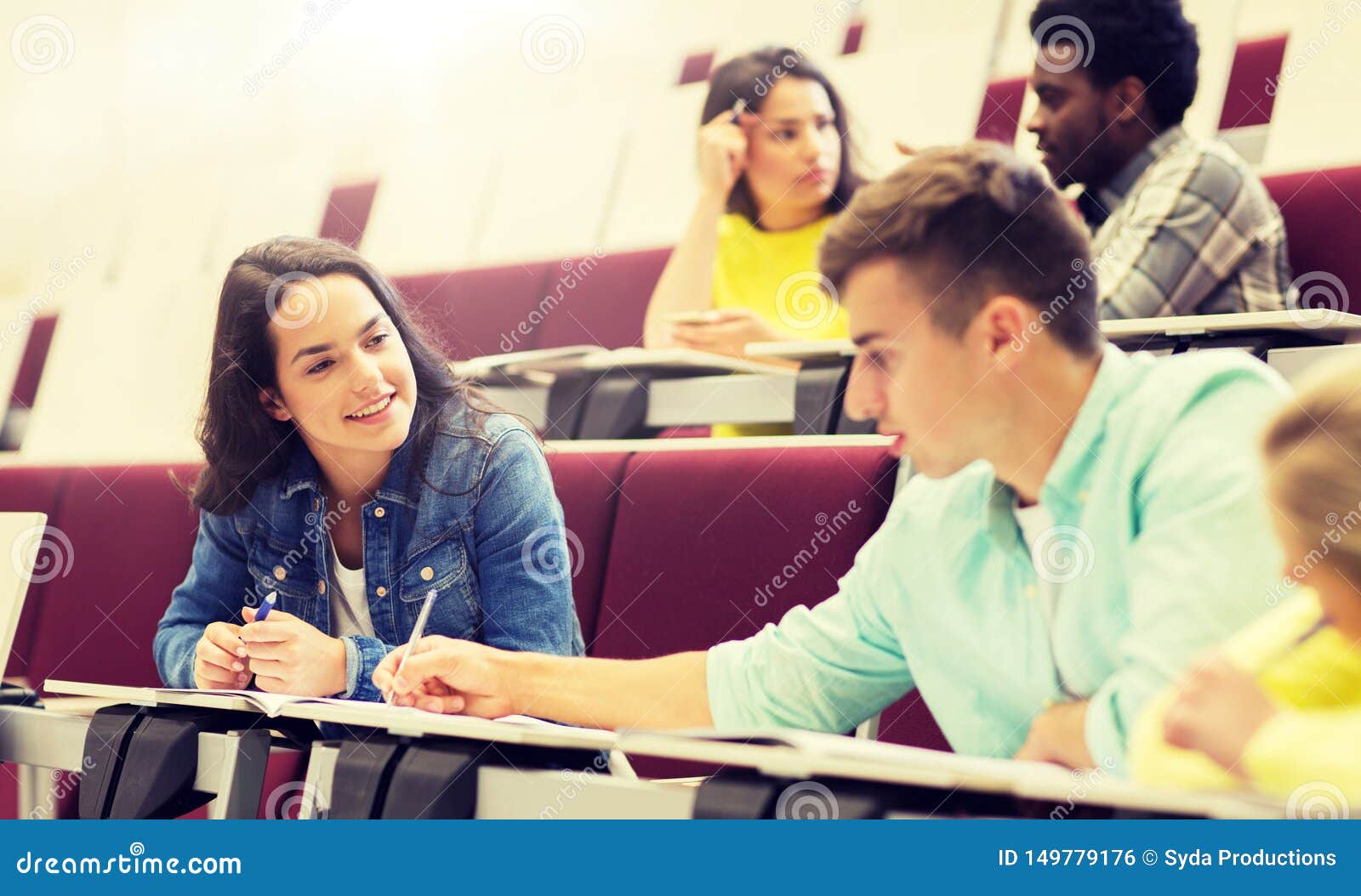 Group of Students with Notebooks in Lecture Hall Stock Photo - Image of ...