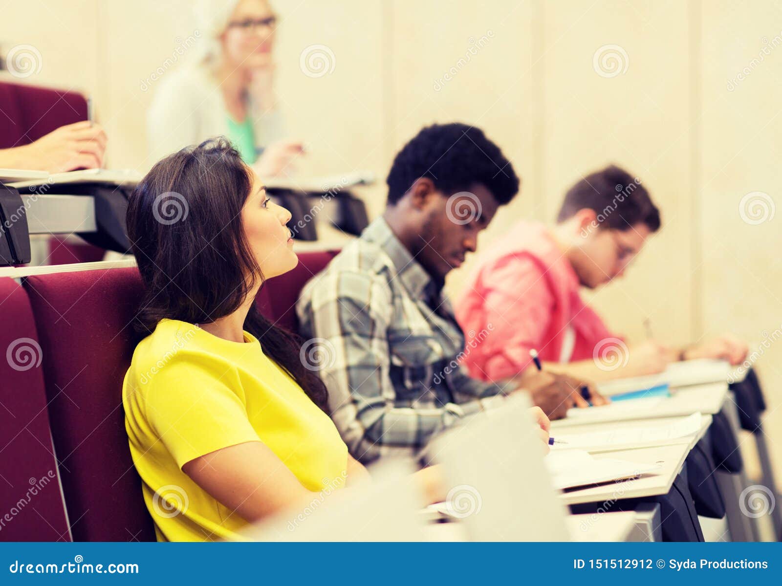 Group of Students with Notebooks in Lecture Hall Stock Photo - Image of ...