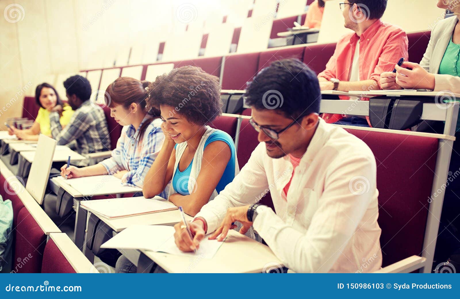 Group of Students with Notebooks in Lecture Hall Stock Image - Image of ...