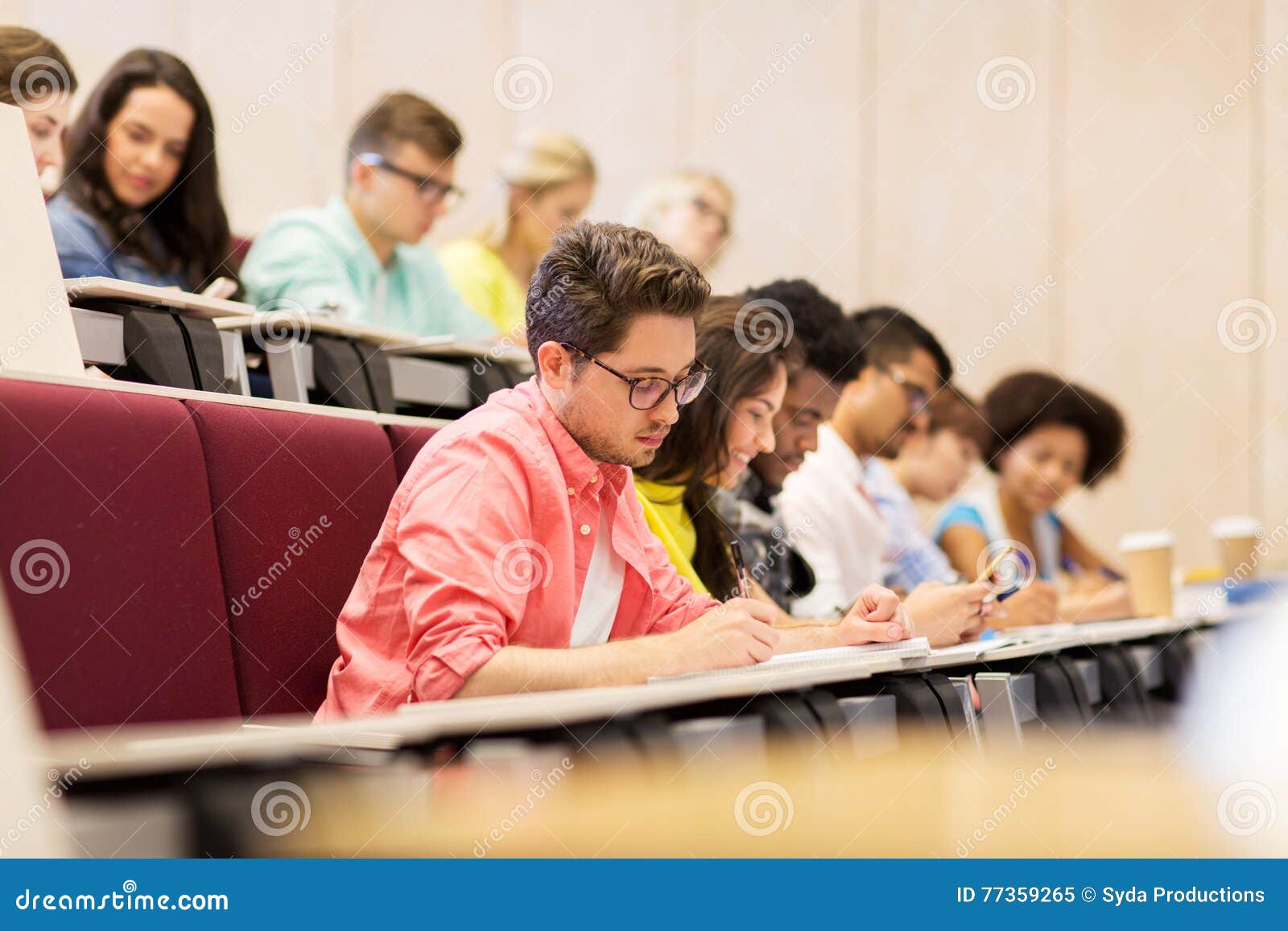 Group of Students with Notebooks in Lecture Hall Stock Image - Image of ...