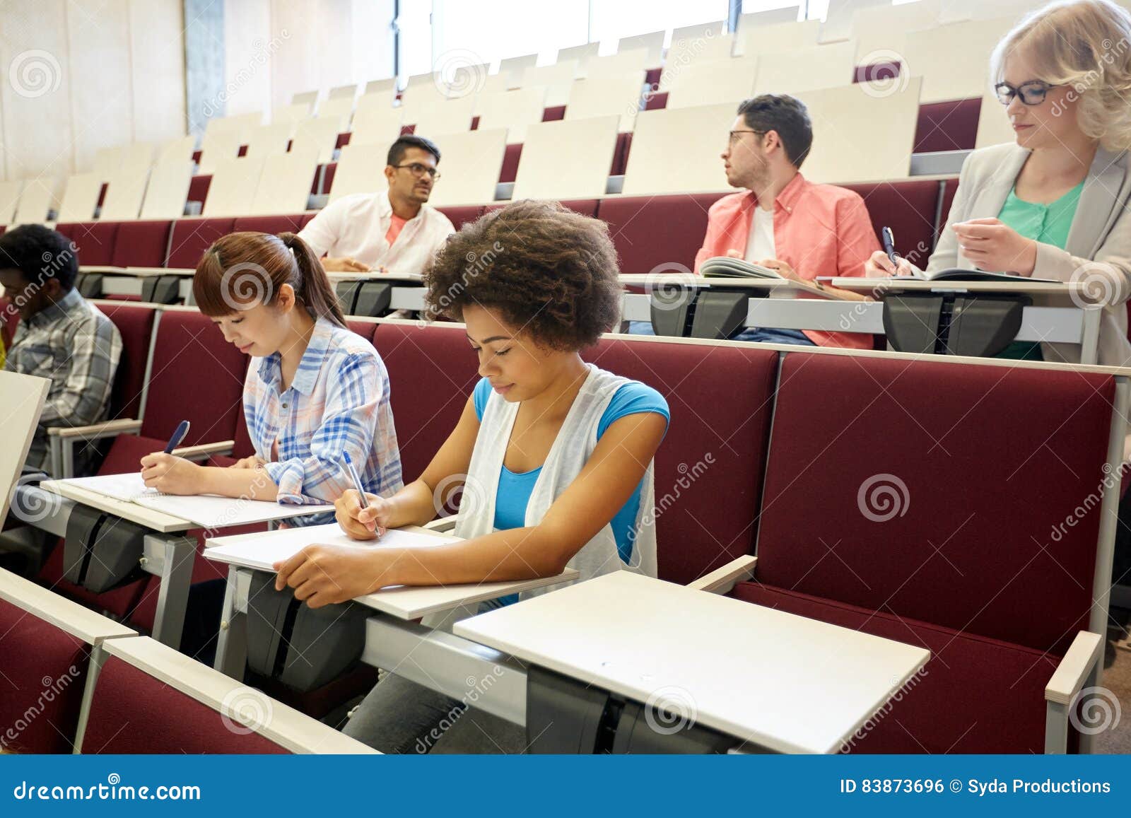 Group of Students with Notebooks at Lecture Hall Stock Photo - Image of ...