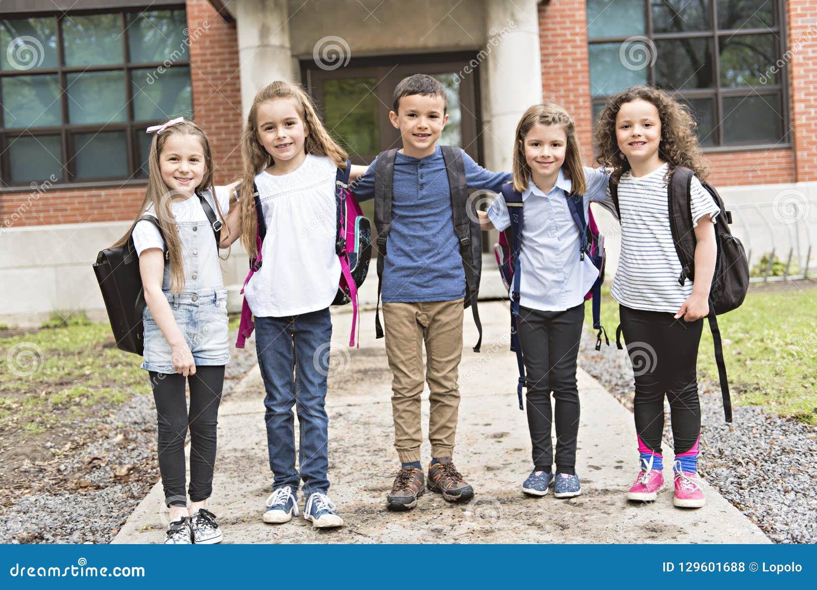 A Group of Students Outside at School Standing Together Stock Photo ...