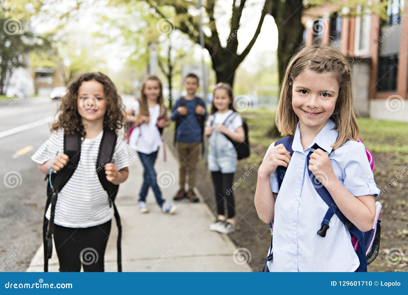 A Group of Students Outside at School Standing Together Stock Photo ...