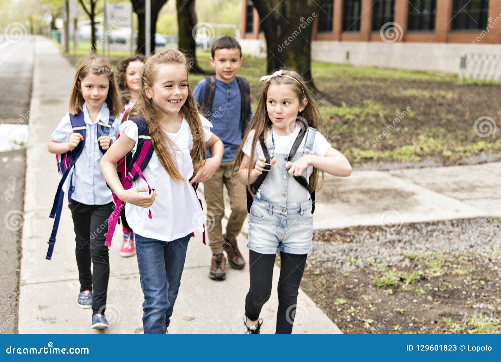 A Group of Students Outside at School Standing Together Stock Image ...