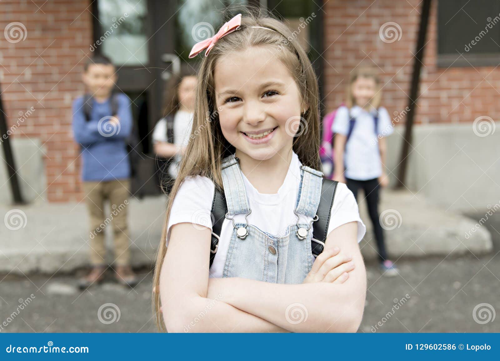 A Group of Students Outside at School Standing Together Stock Photo ...