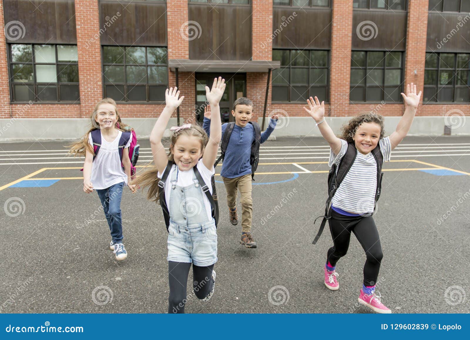 A Group of Students Outside at School Standing Together Stock Image ...