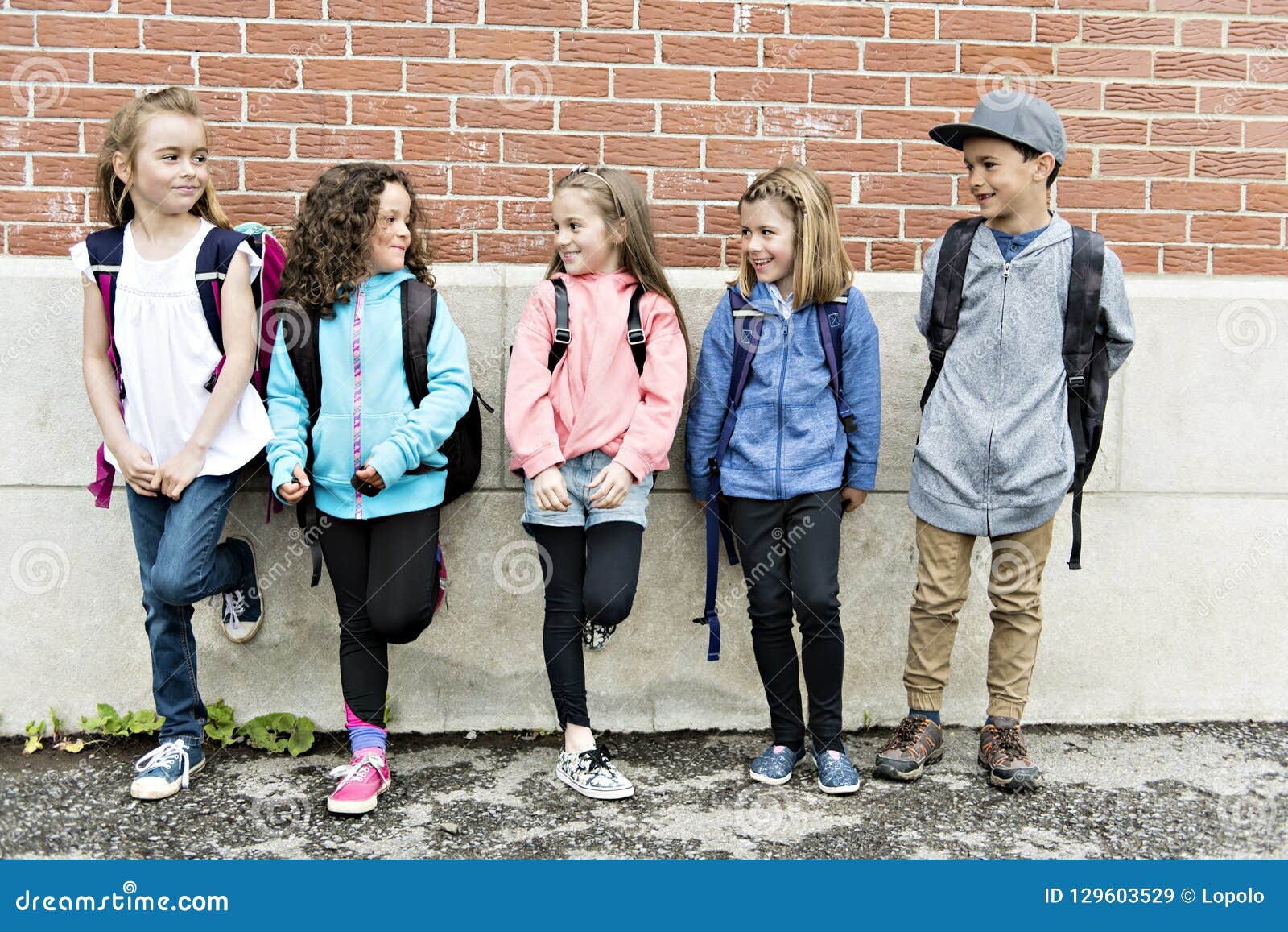 A Group of Students Outside at School Standing Together Stock Image ...