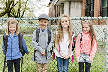 A Group of Students Outside at School Standing Together Stock Photo ...
