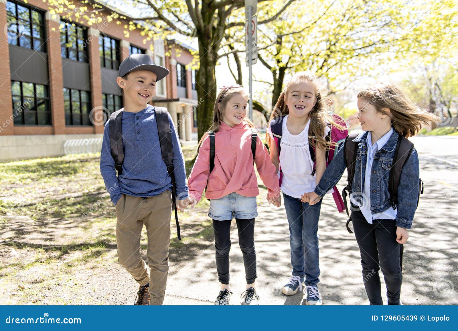 A Group of Students Outside at School Standing Together Stock Image ...