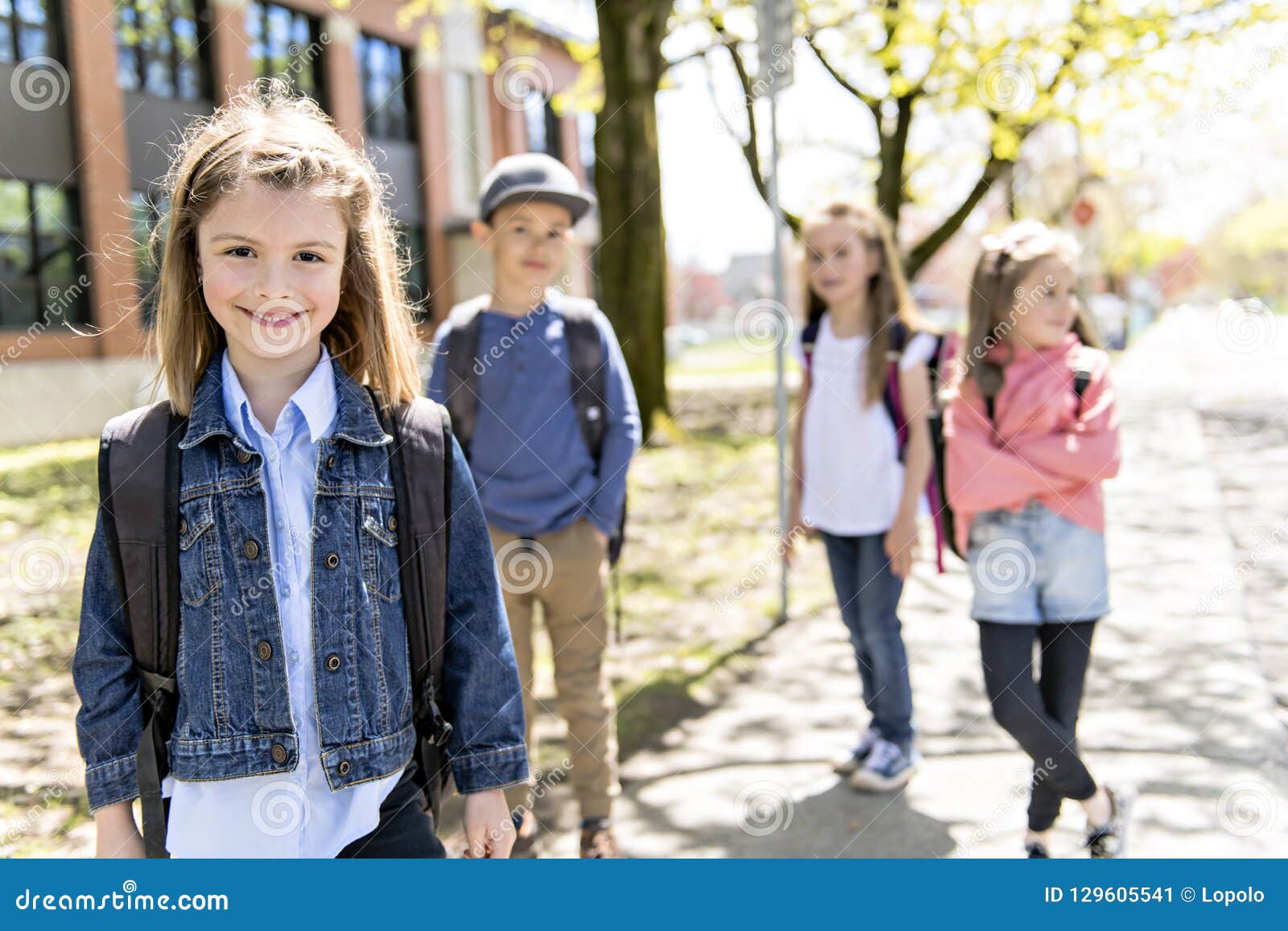 A Group of Students Outside at School Standing Together Stock Image ...