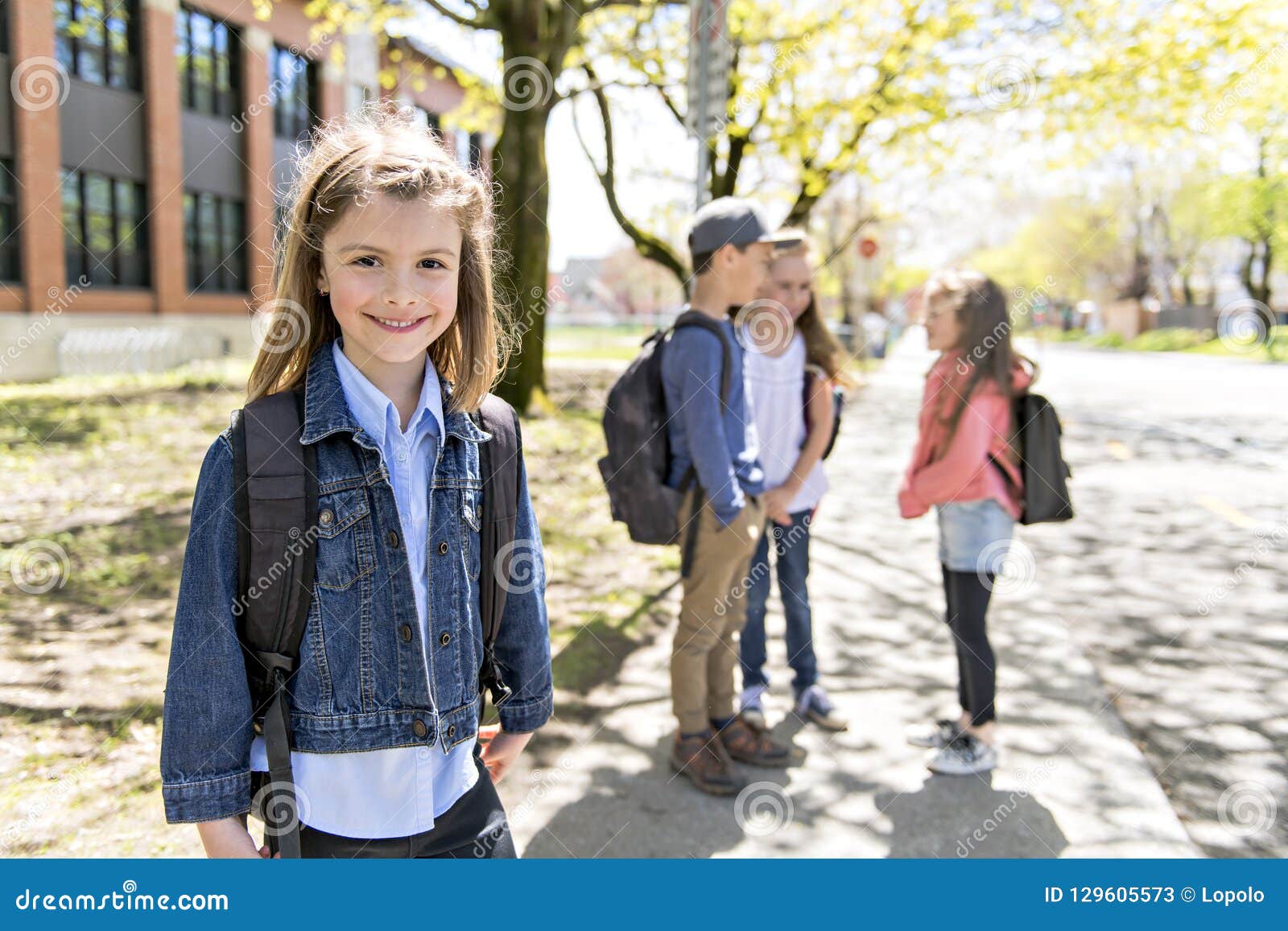 A Group of Students Outside at School Standing Together Stock Image ...