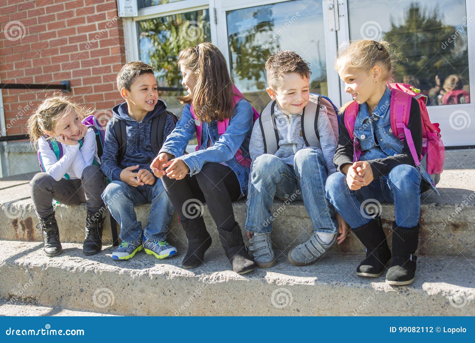Students Outside School Standing Together Stock Photo - Image of ...