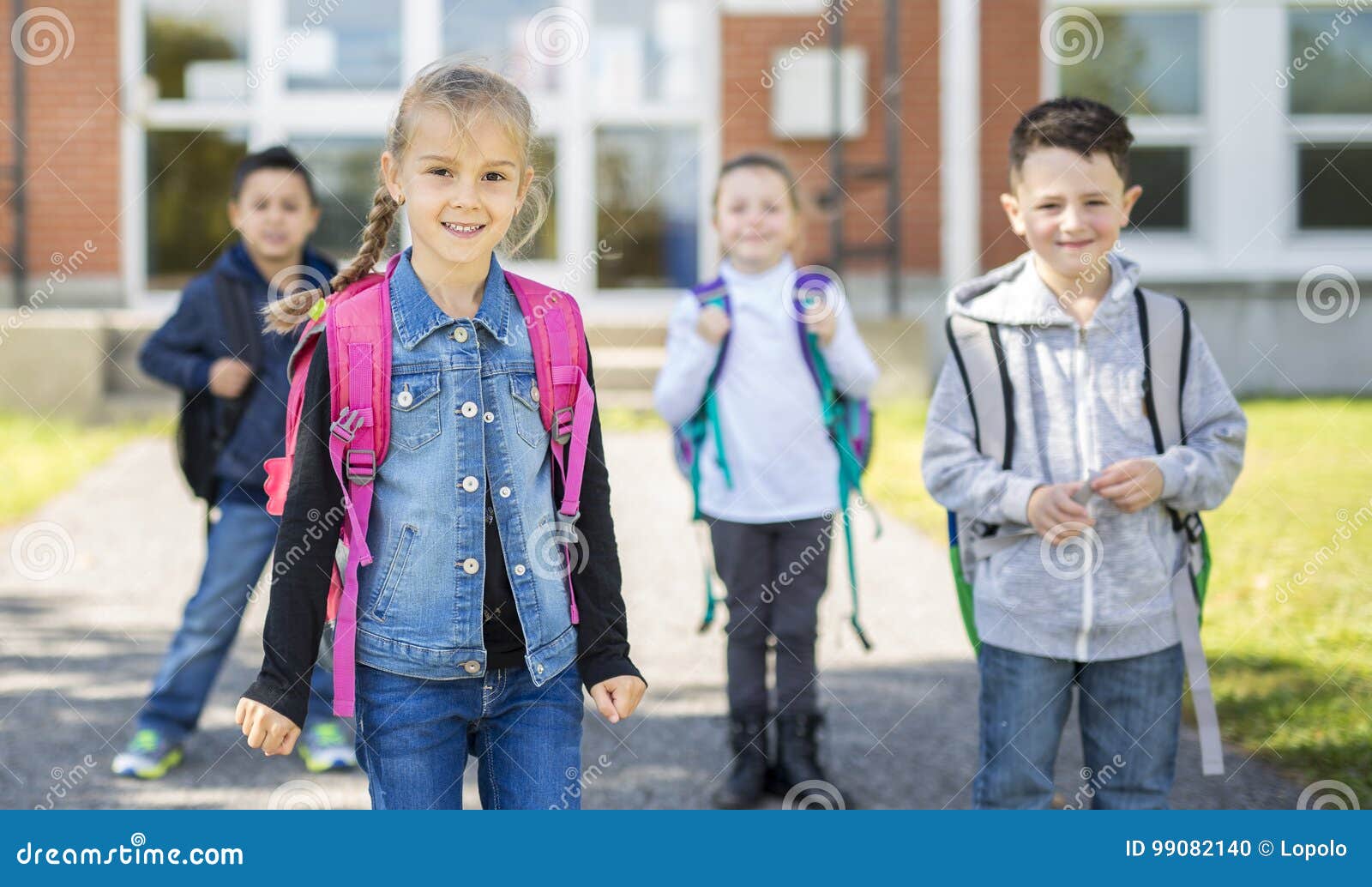 Students Outside School Standing Together Stock Photo - Image of school ...