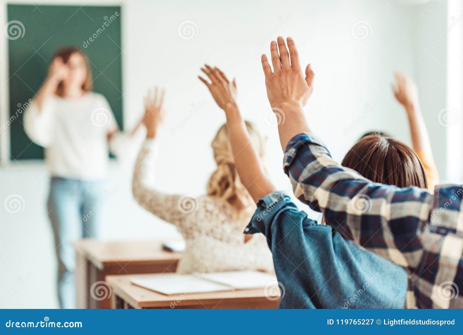 Group of Students Raising Hands in Class Stock Image - Image of lesson ...