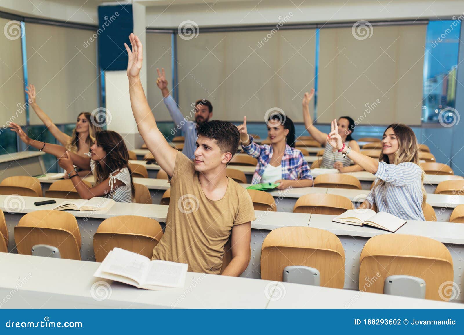 Students Raising Hands in Class on Lecture Stock Photo - Image of desk ...