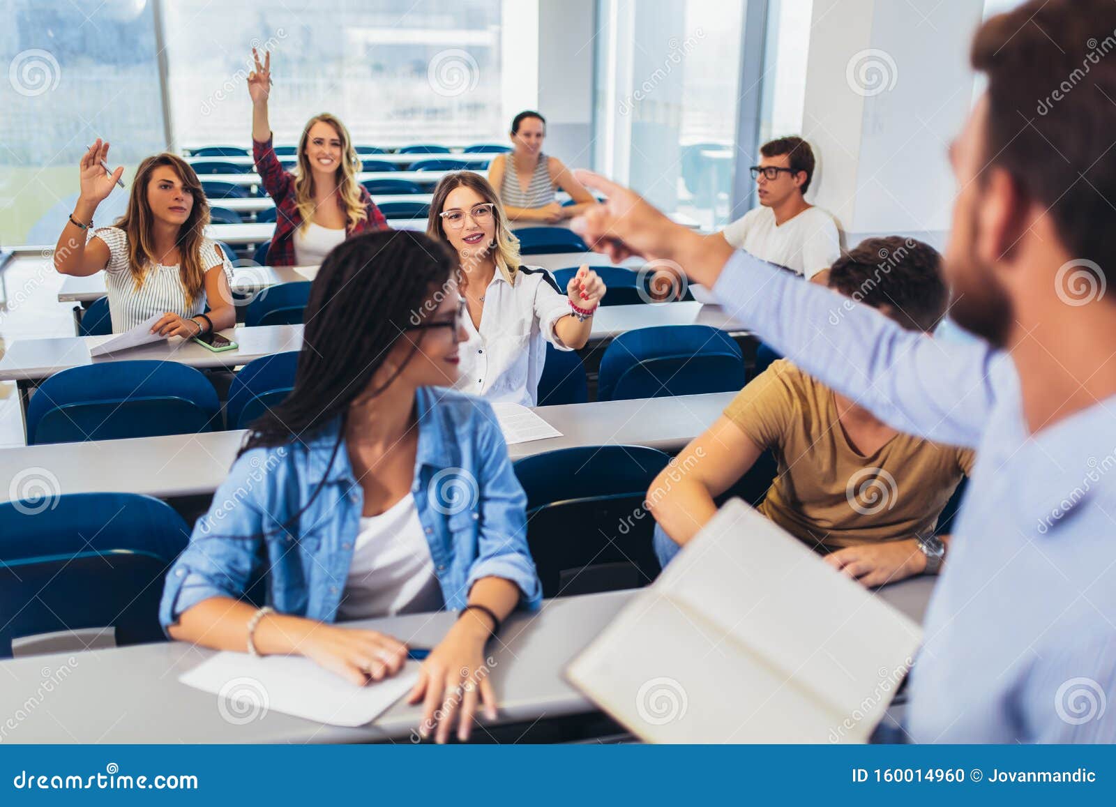 Students Raising Hands in Class on Lecture Stock Photo - Image of ...