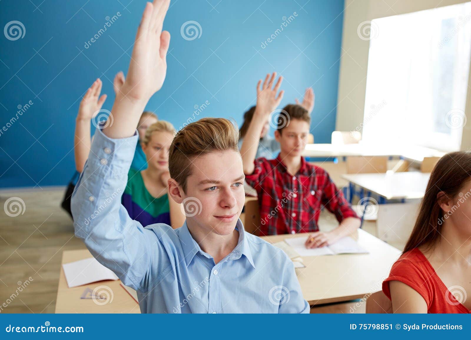 Group of Students Raising Hands at School Lesson Stock Image - Image of ...