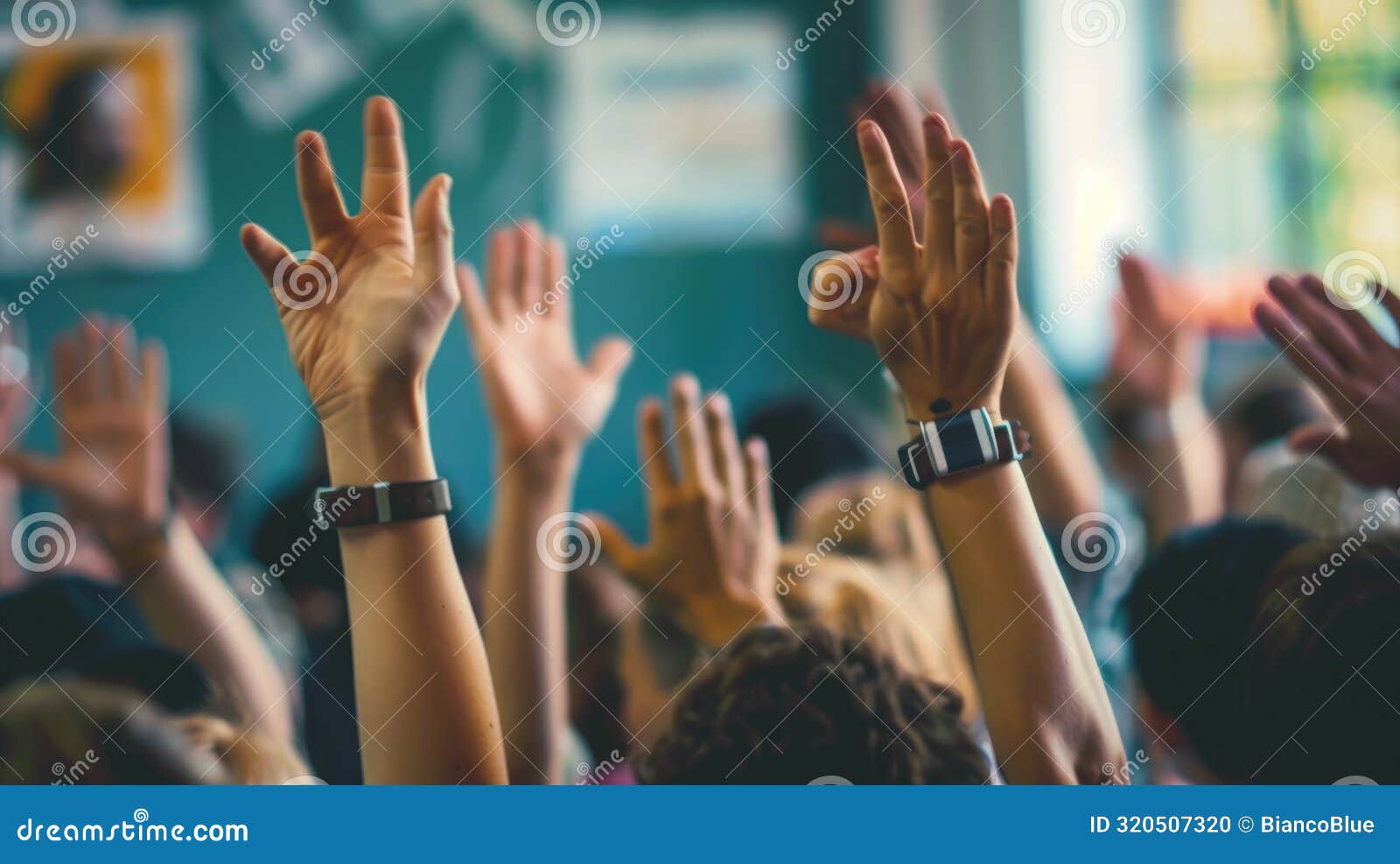 A Group of Students Raising Their Hands in a Classroom, Eager To Answer ...