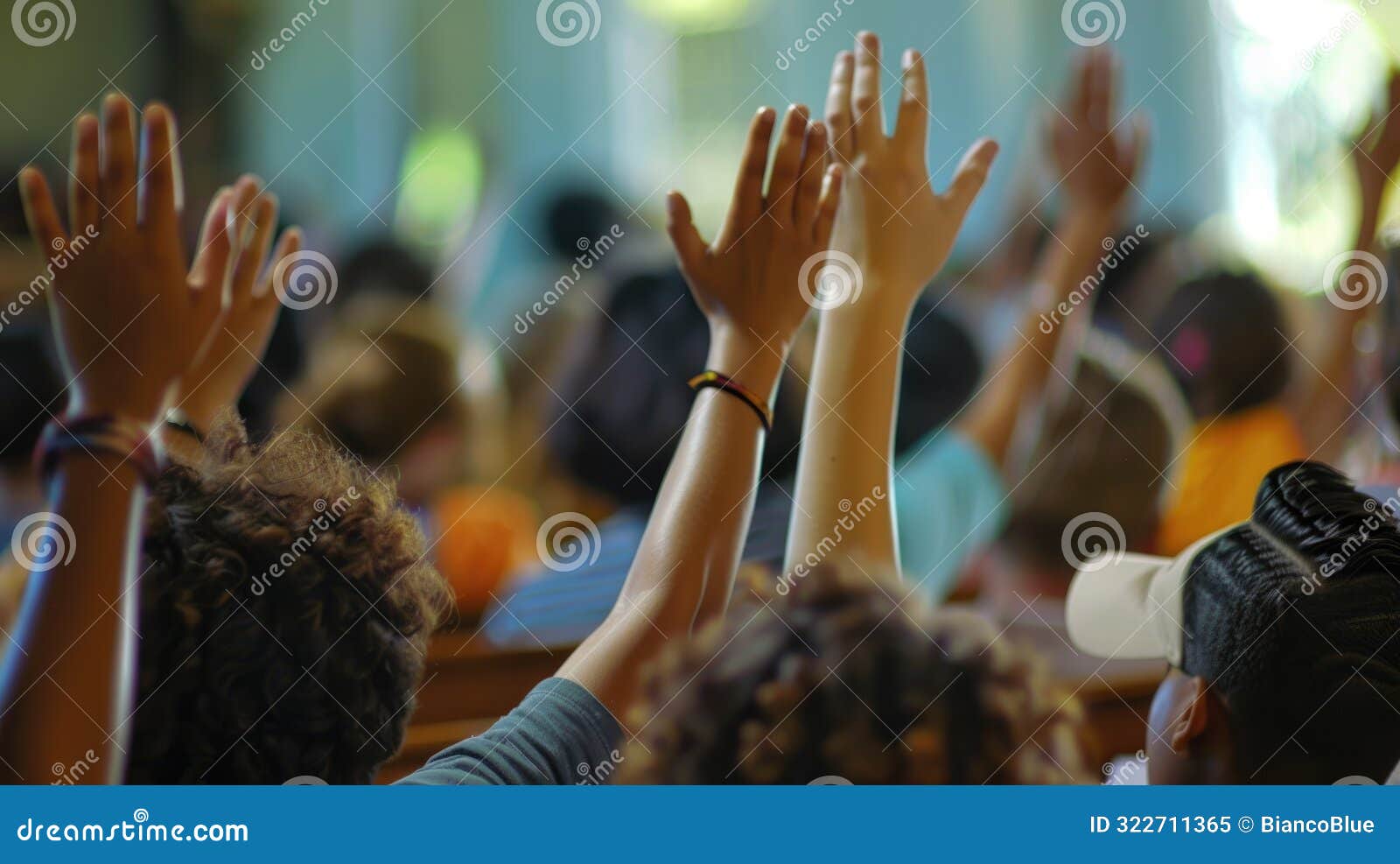 A Group of Students Raising Their Hands in a Classroom, Eager To Answer ...